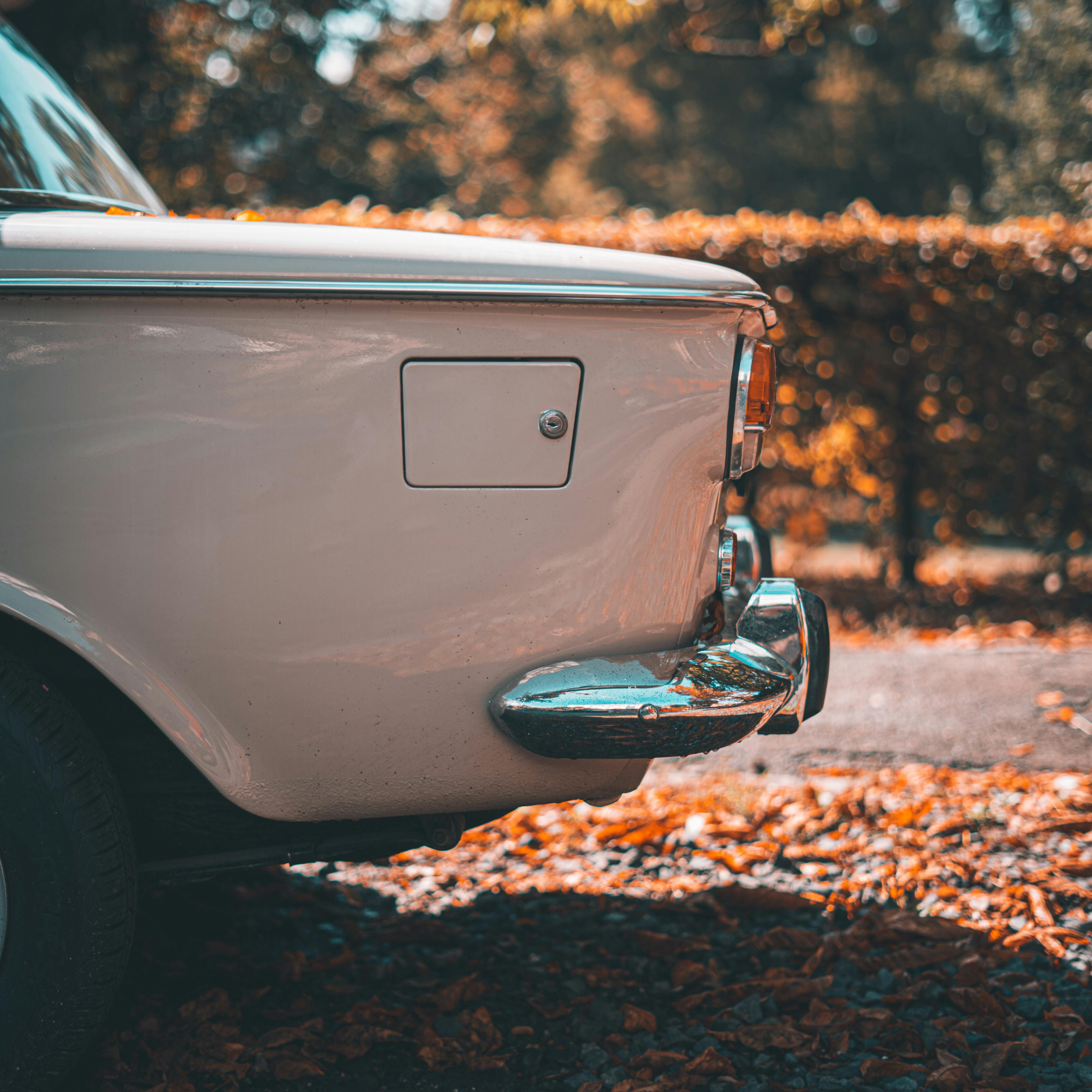 Close Up Shot of a Beige Car · Free Stock Photo