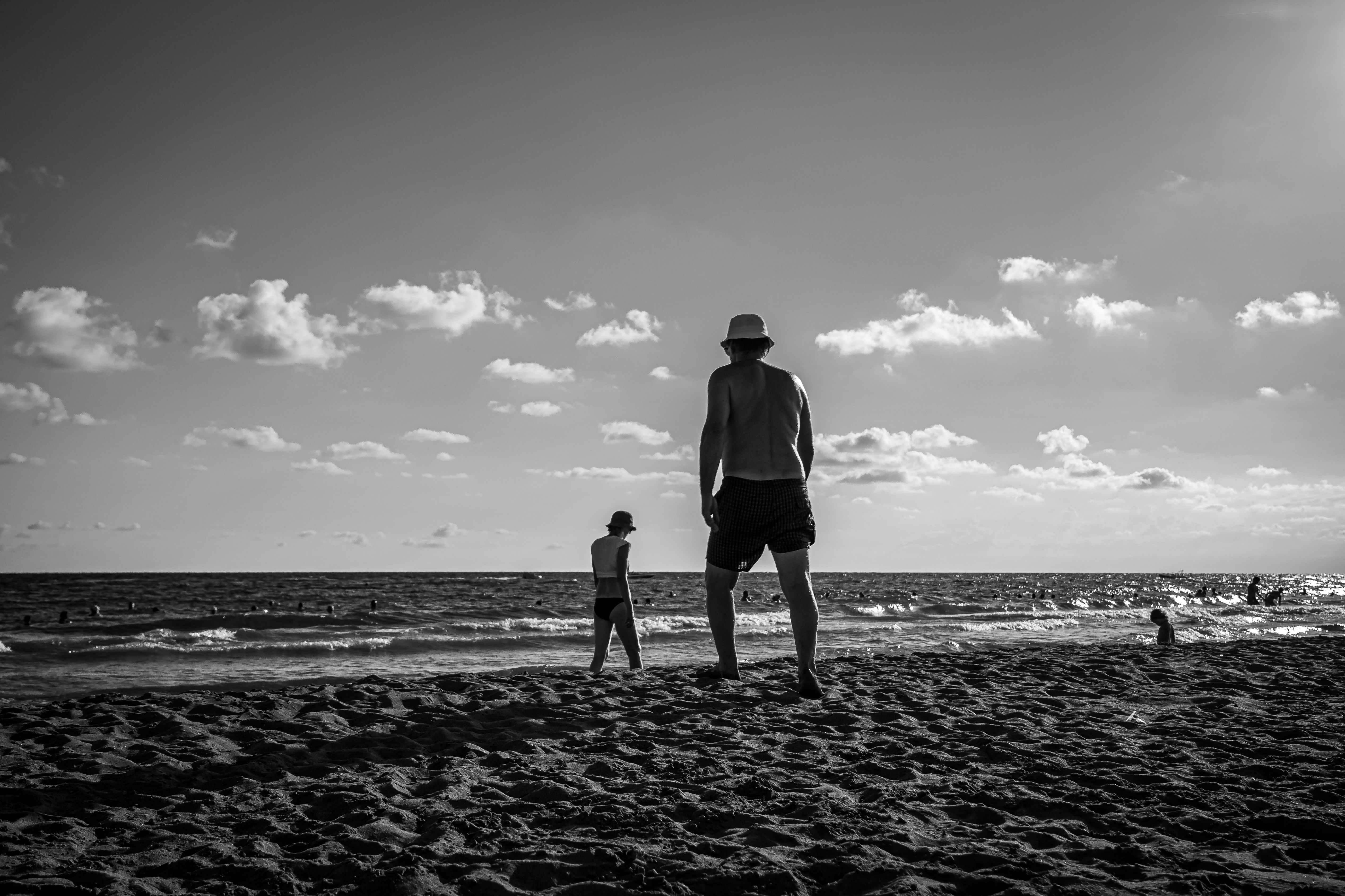 Grayscale Photography of People on the Beach · Free Stock Photo