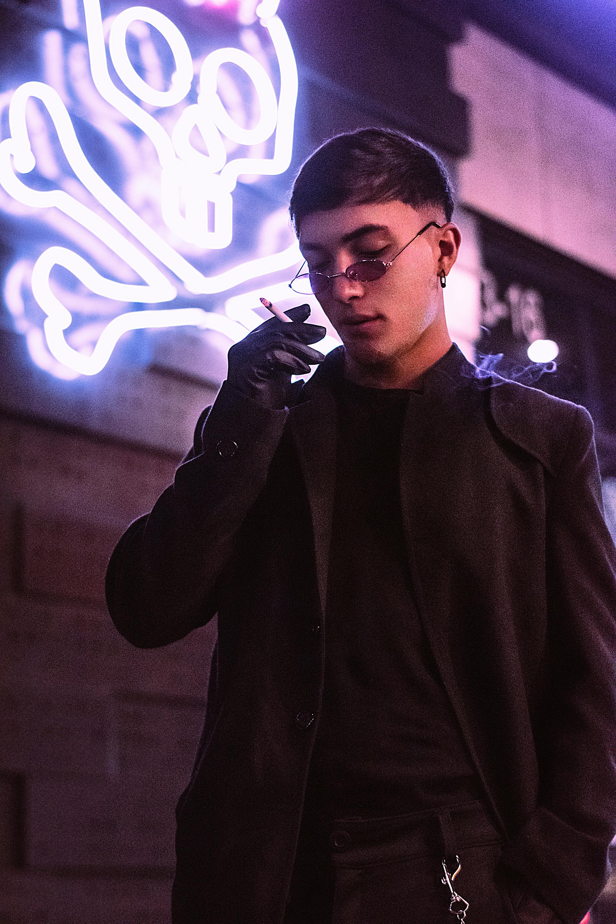 Man Smoking Cigarette Inside the House · Free Stock Photo