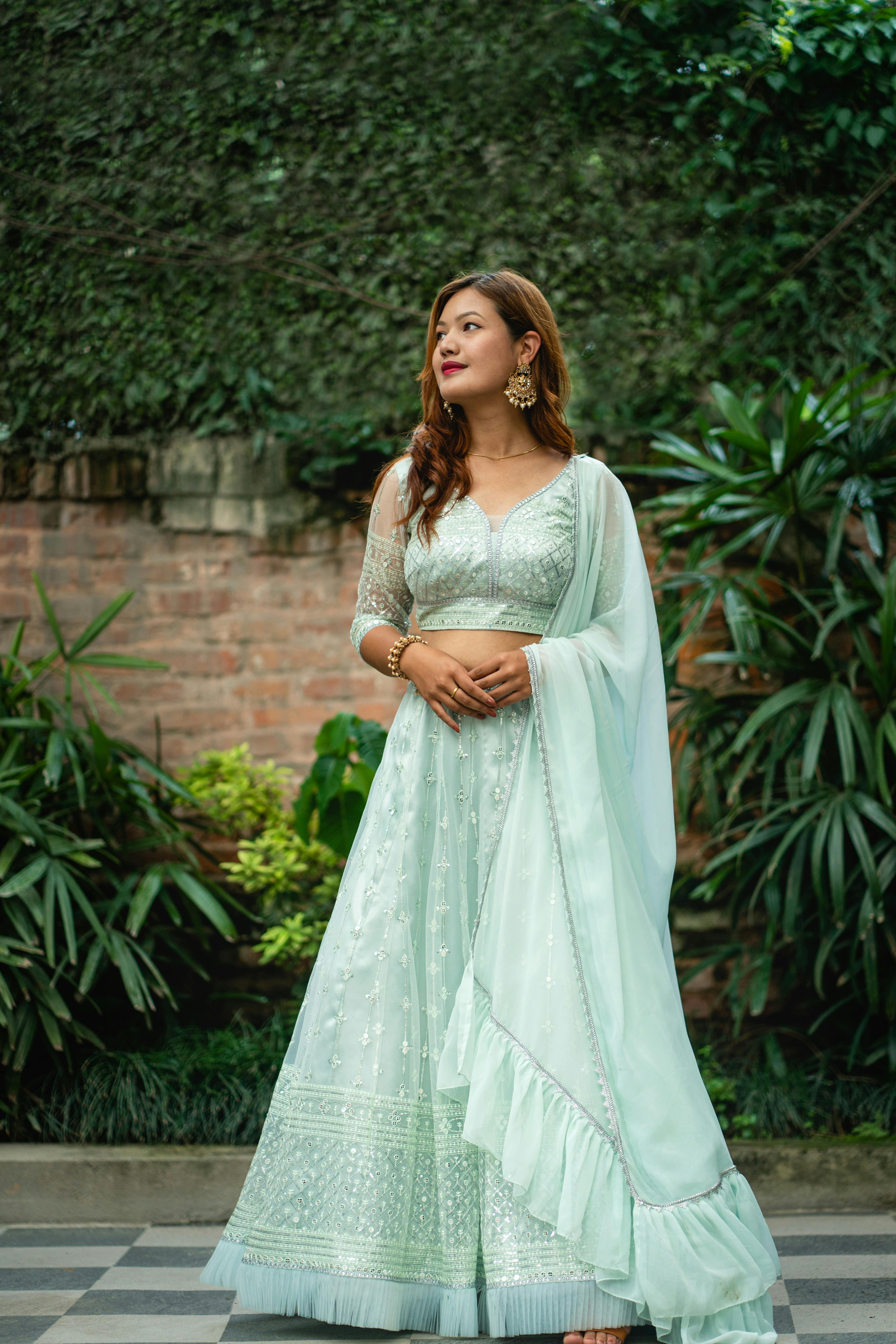 A Woman in White Saree Standing · Free Stock Photo