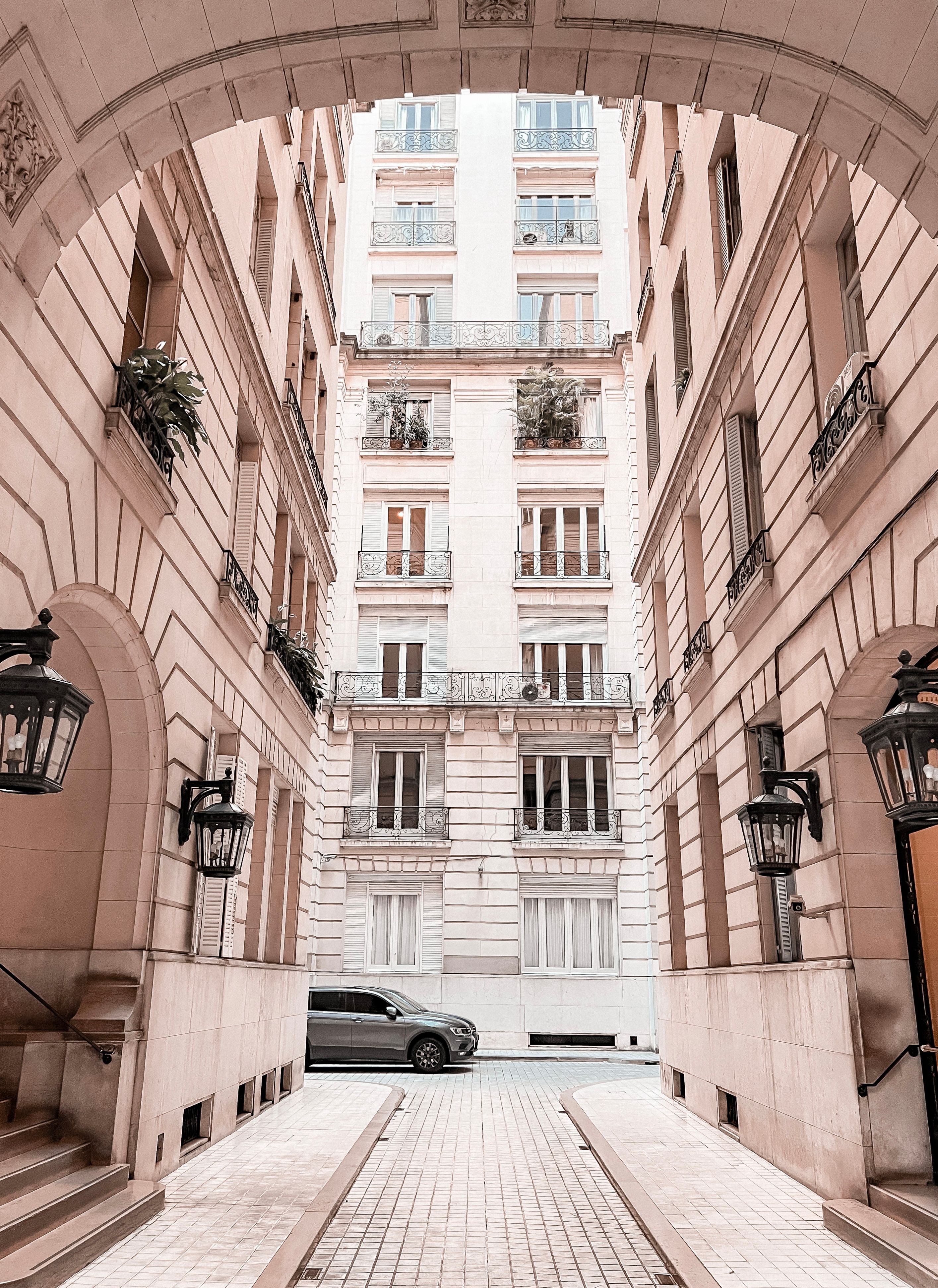 Car Between Building in City Street · Free Stock Photo