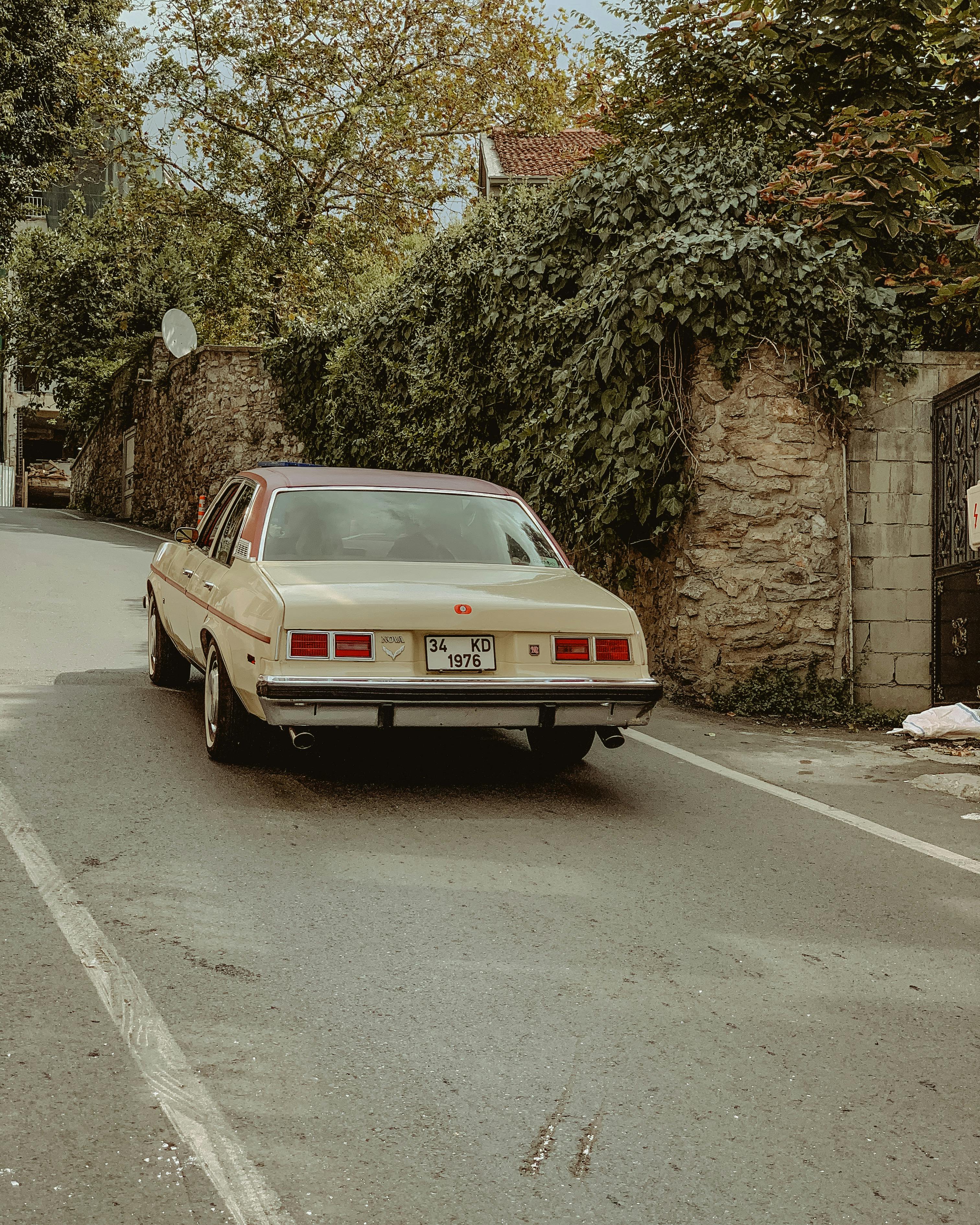 Brown Vintage Car on Road · Free Stock Photo