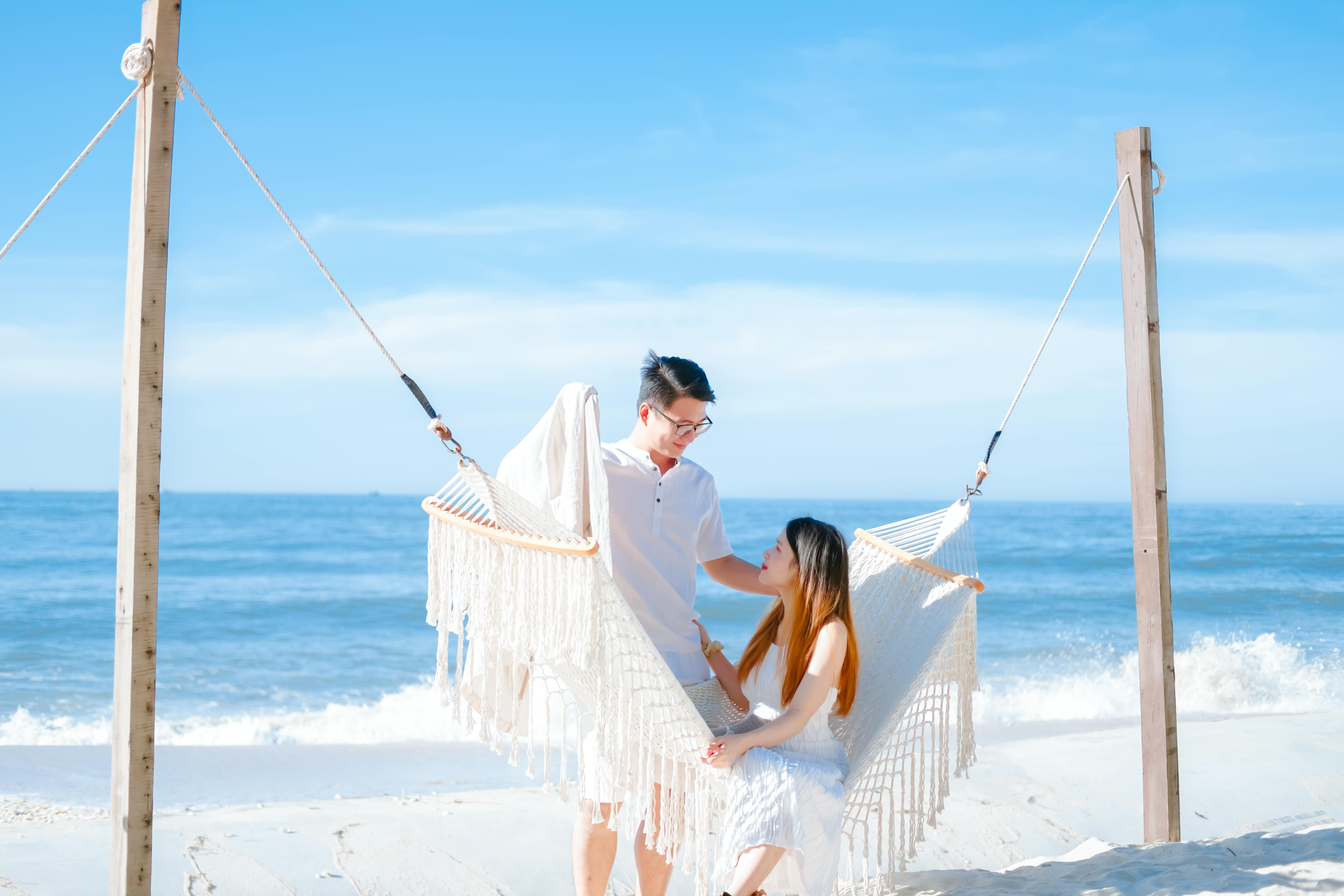 Beautiful Couple at the Beach · Free Stock Photo