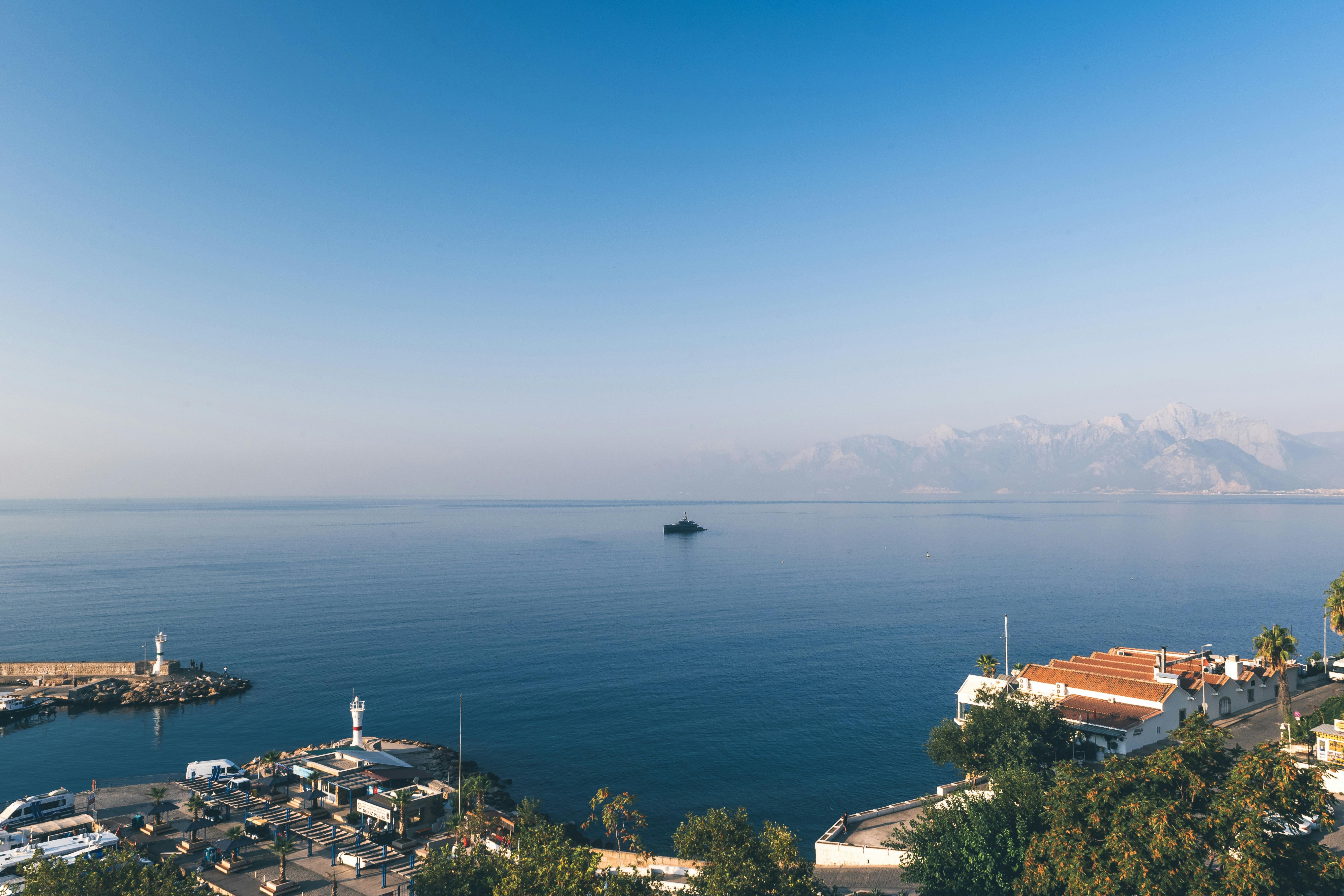 Calm Sea Under Blue Sky · Free Stock Photo