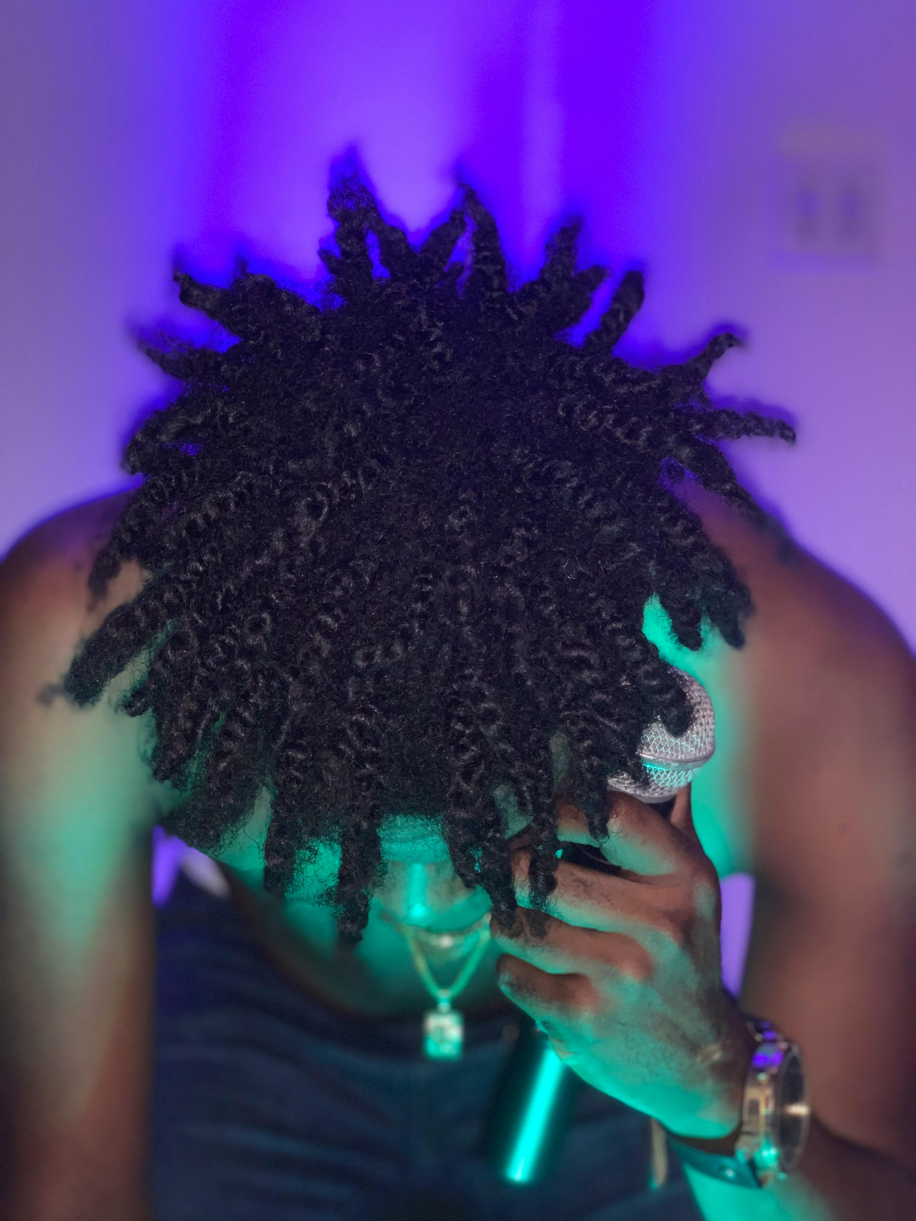 A Rapper Performing on Stage · Free Stock Photo