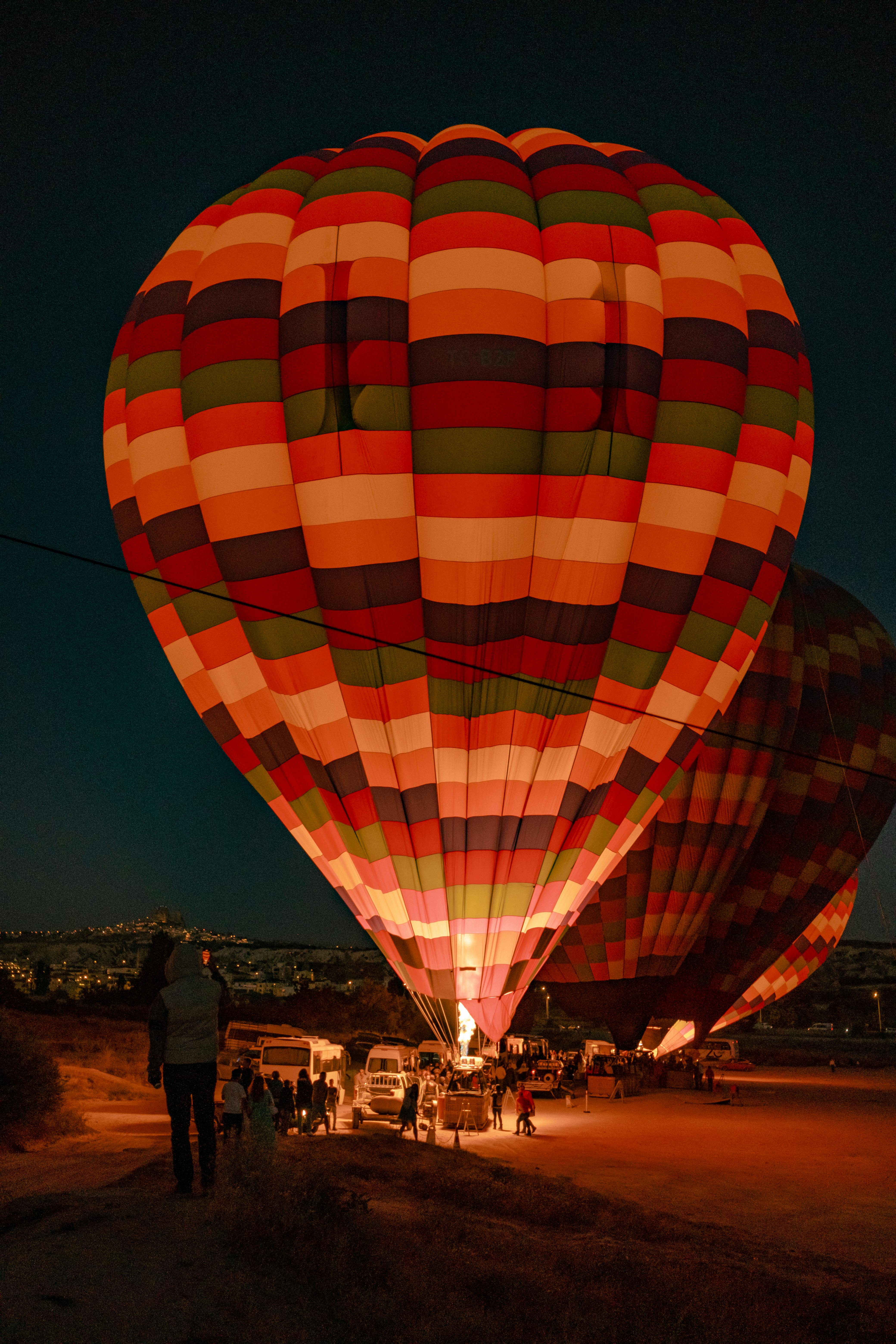 Colorful Hot-Air Balloons on the Ground · Free Stock Photo