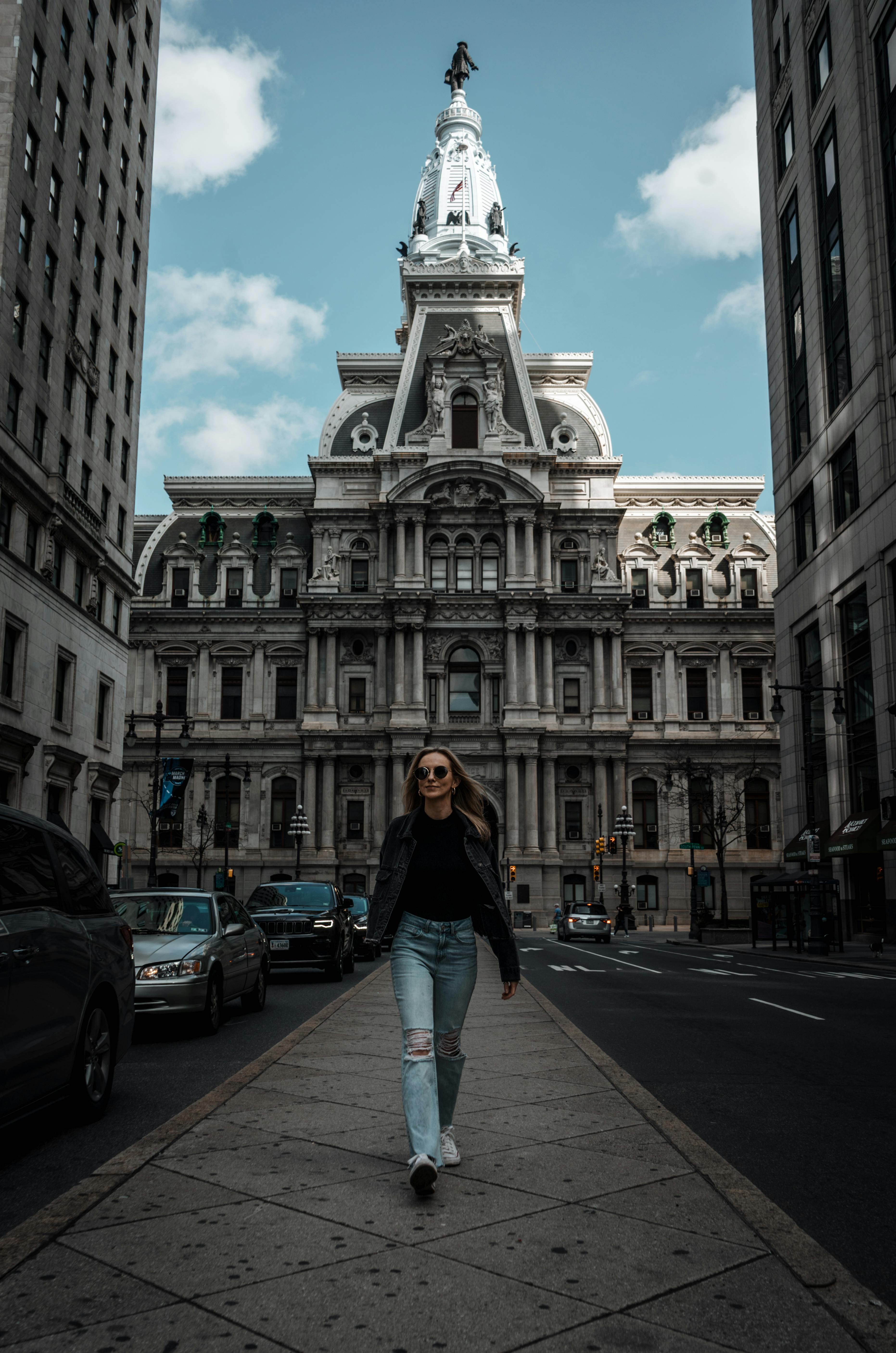 Woman Walking on City Street · Free Stock Photo