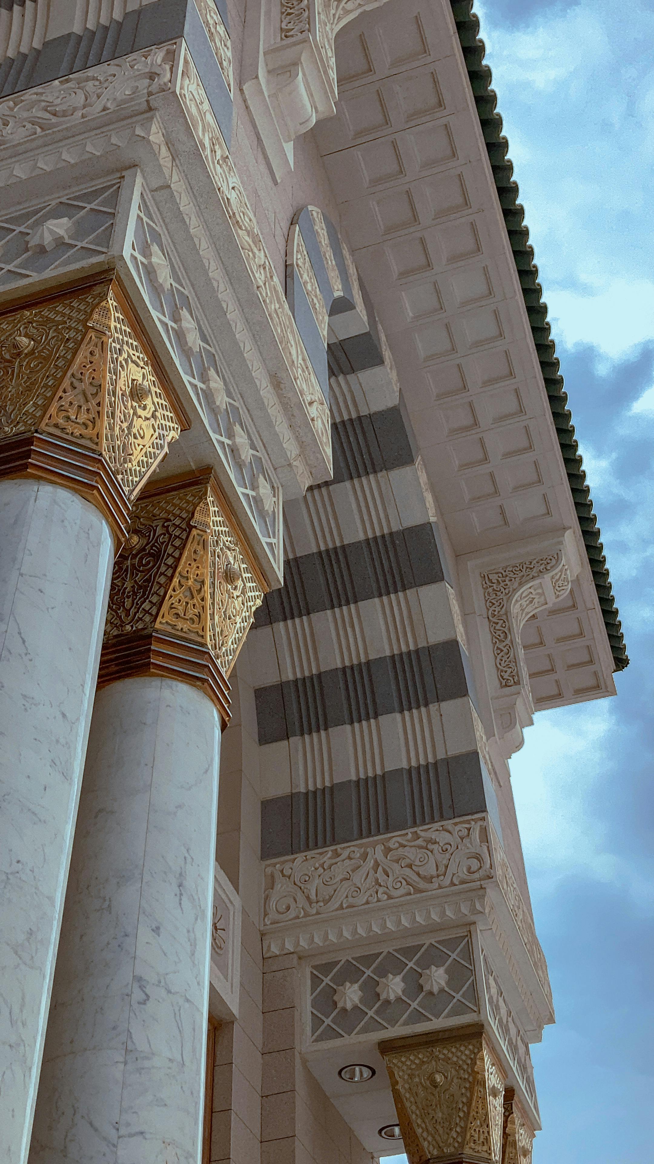 Pillars and Archway of a Concrete Building · Free Stock Photo