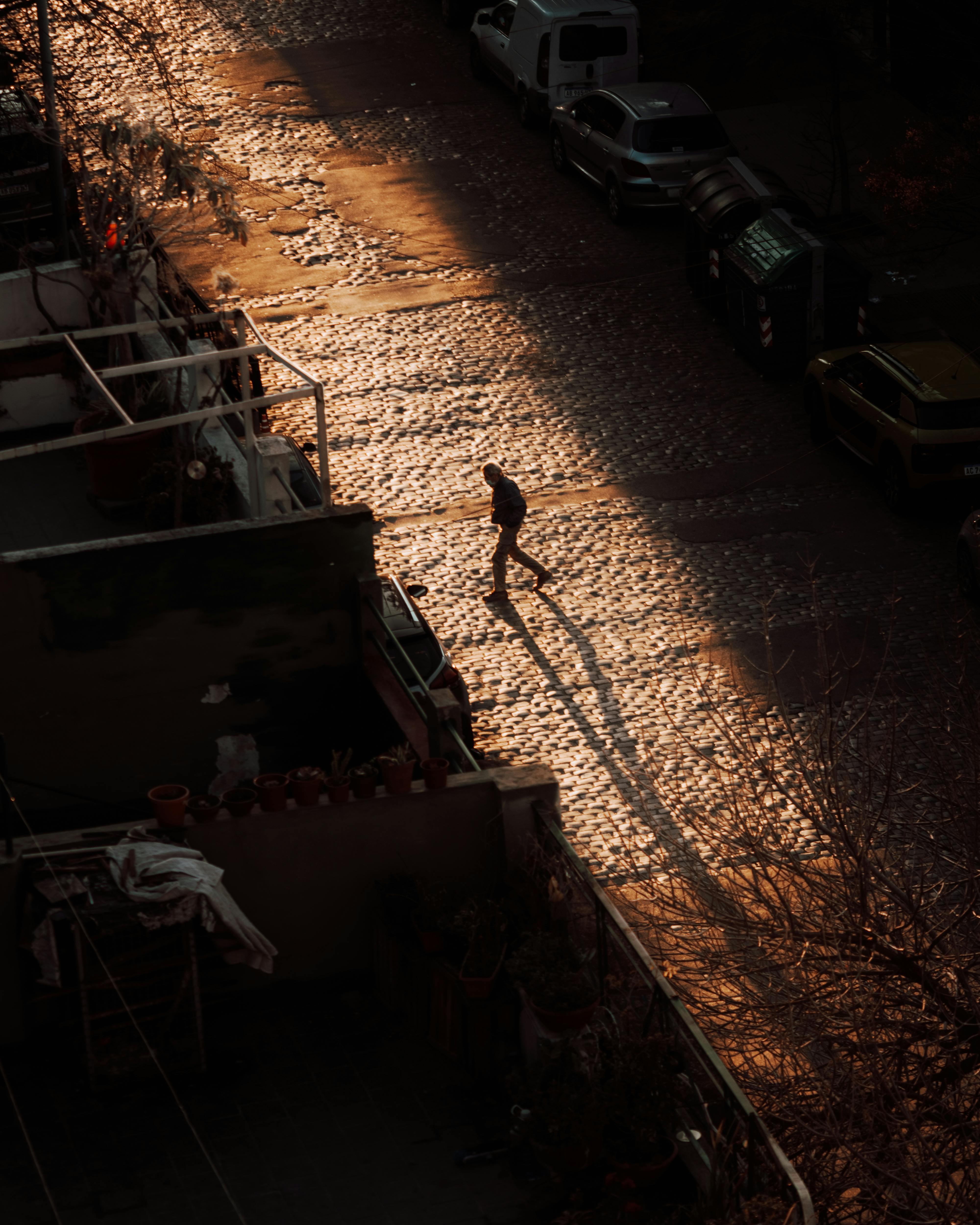 Man Crossing Sunlit · Free Stock Photo