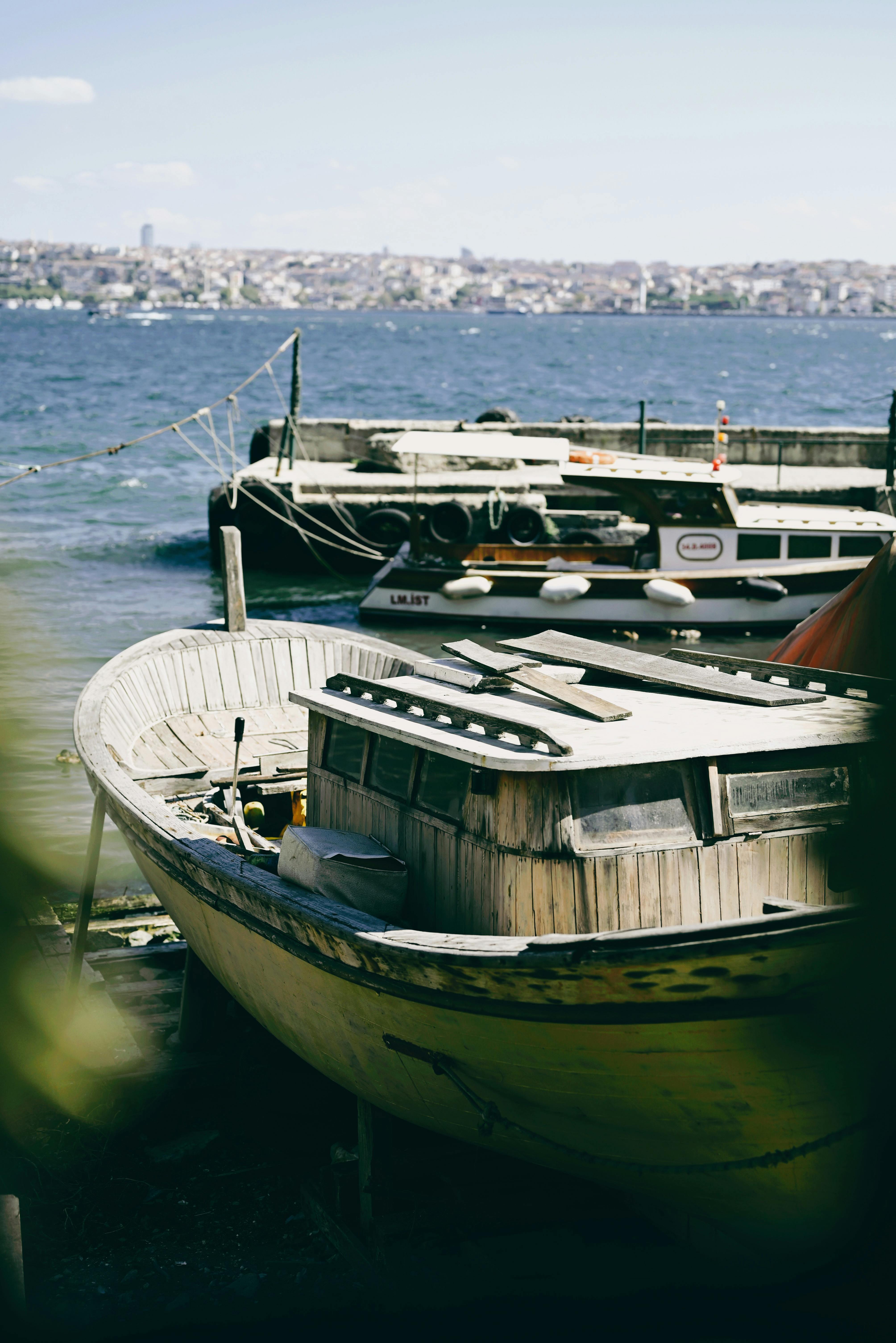 White and Brown Boat on Water · Free Stock Photo
