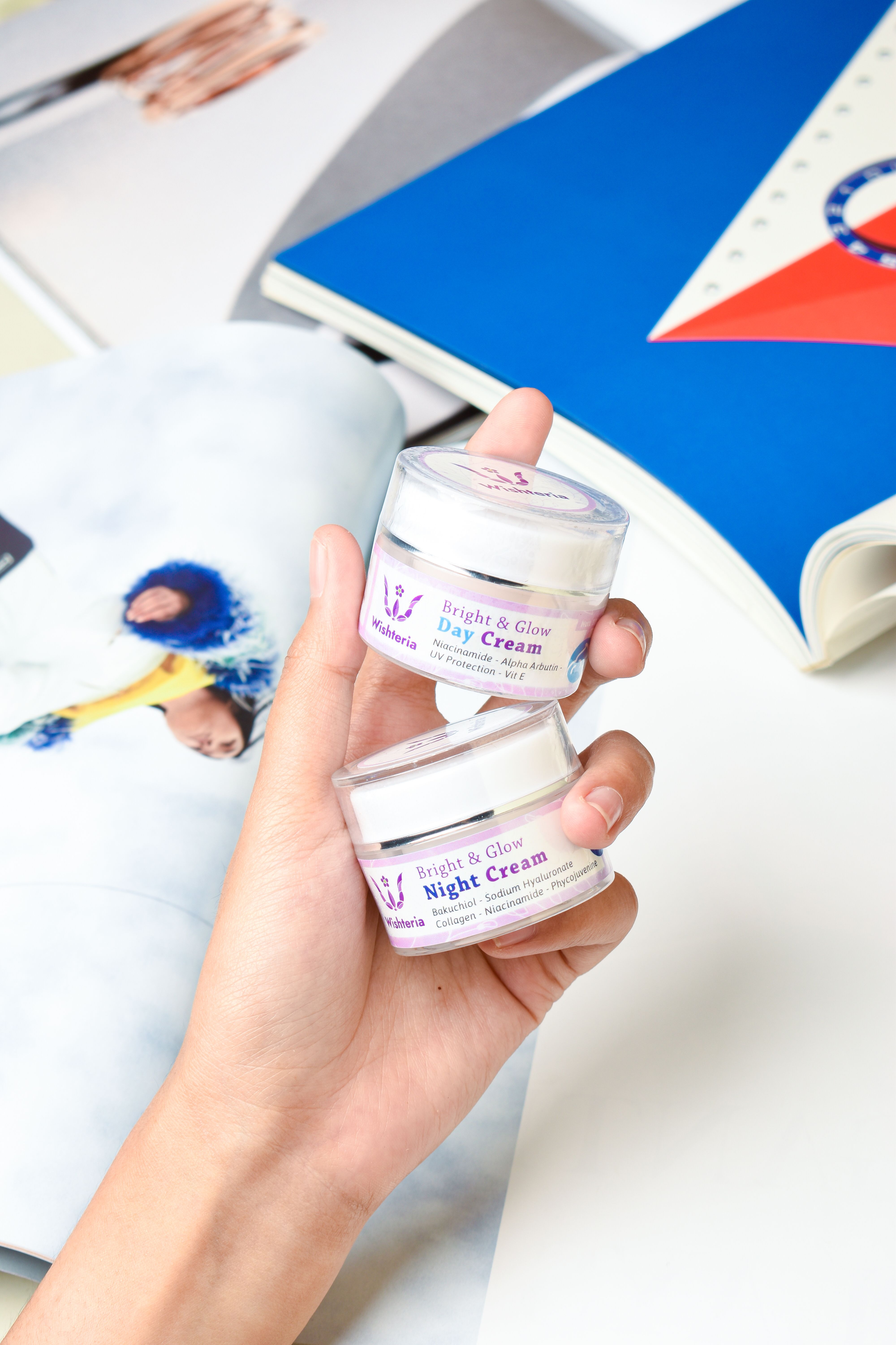 Person Holding A Skin Care Cream In White Tube · Free Stock Photo