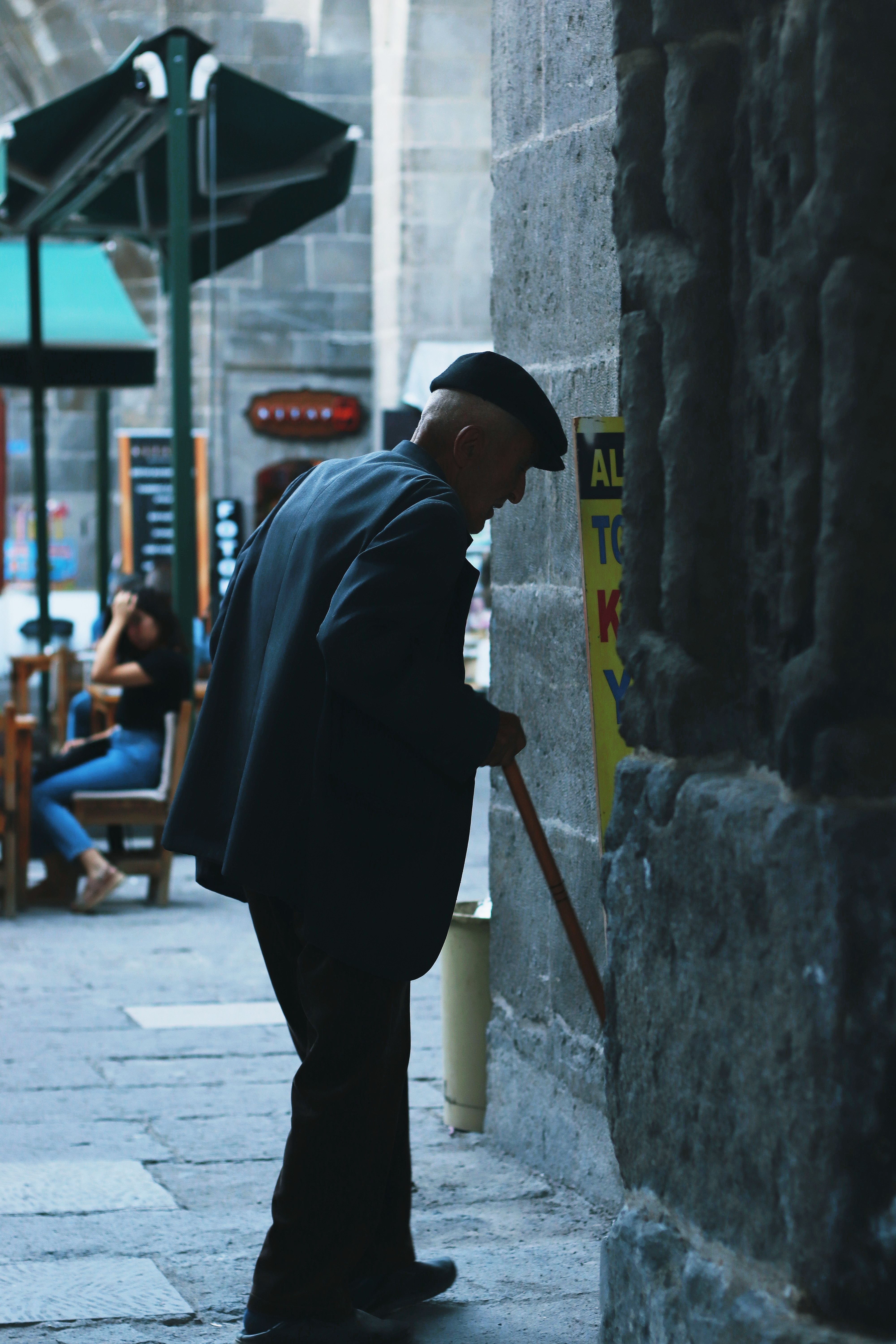 Old Man with Stick Walking to Church · Free Stock Photo