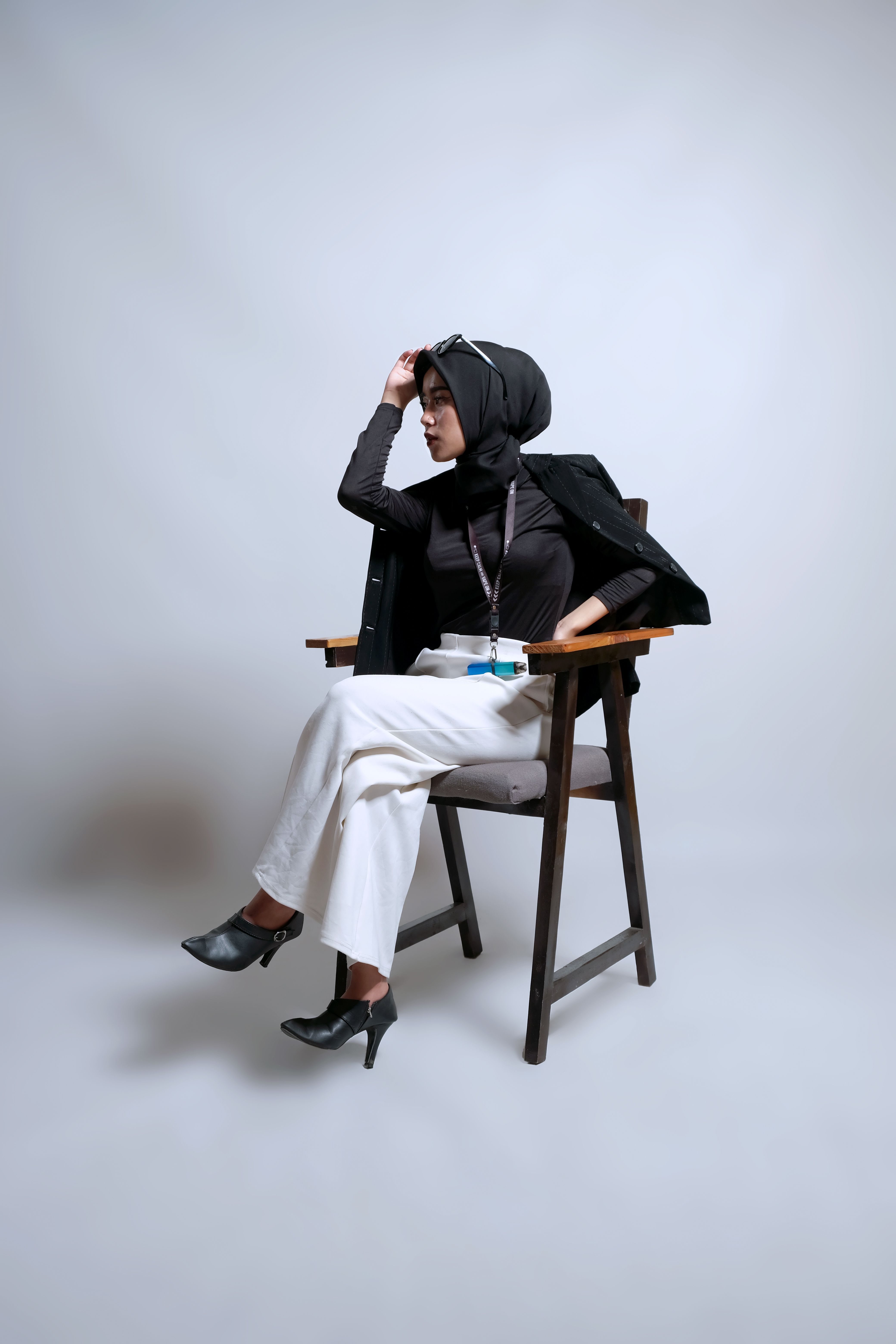 A Woman in Hijab Sitting on the Chair · Free Stock Photo