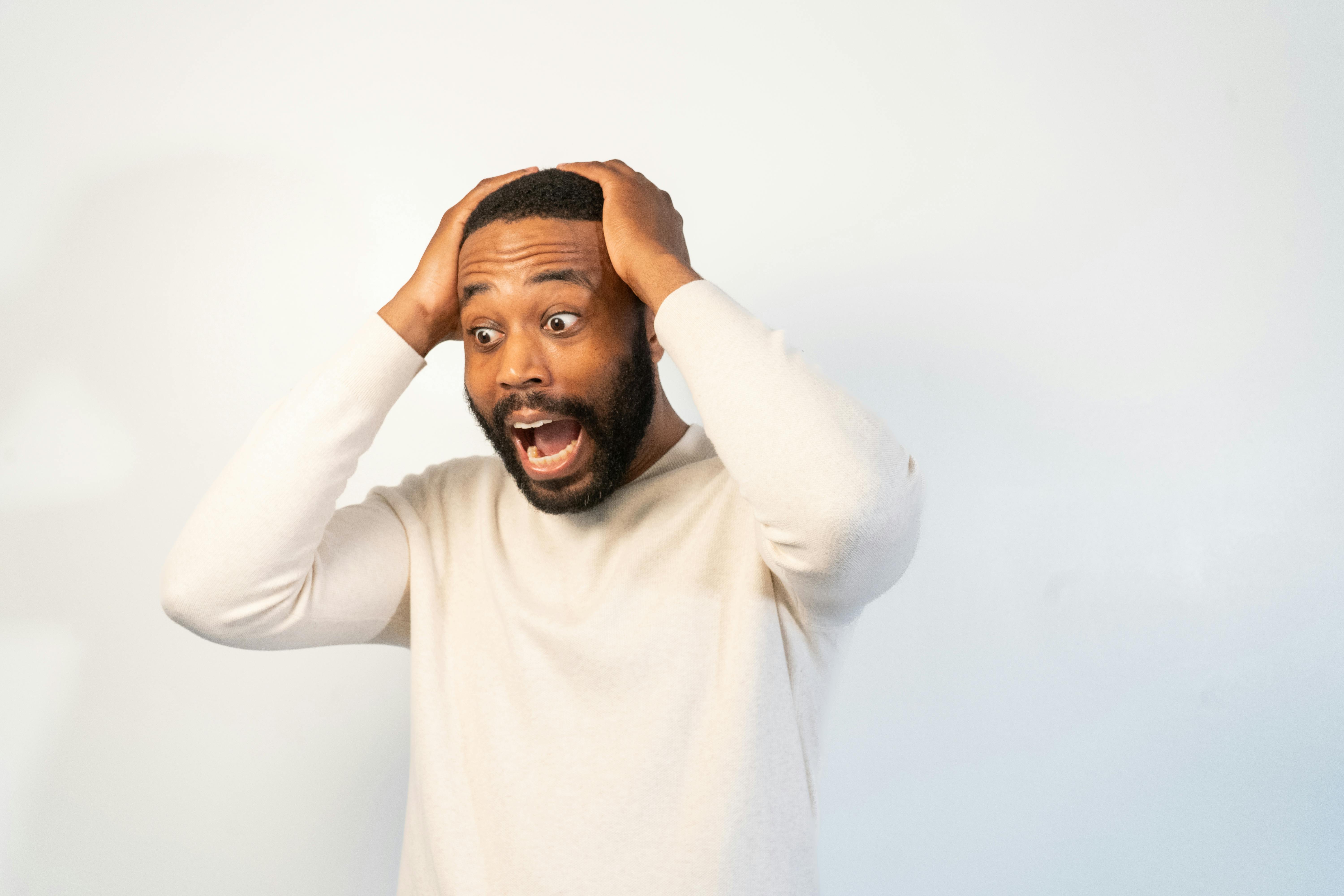 Photo of a Man with a Shocked Facial Expression · Free Stock Photo