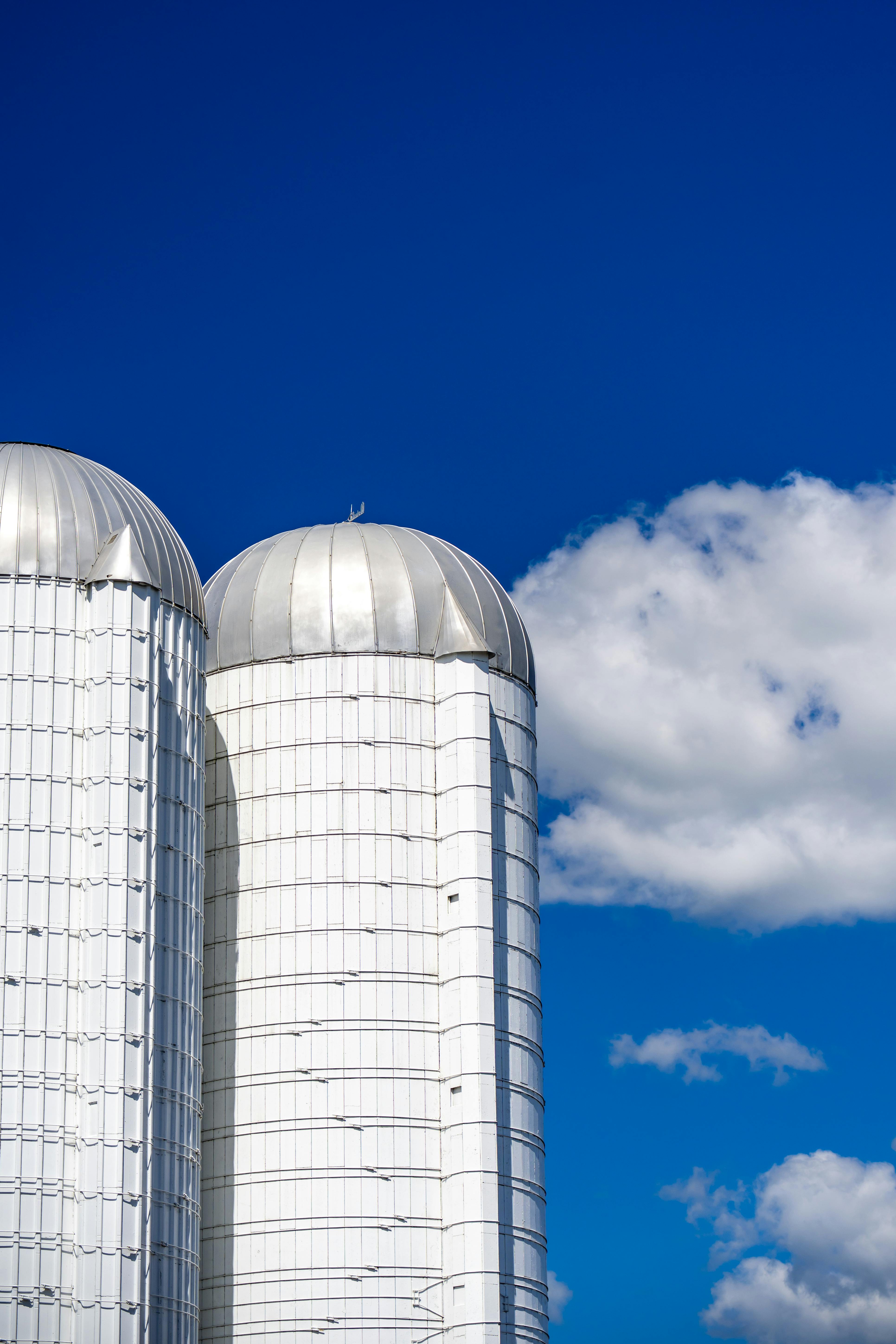 White Silos Buildings · Free Stock Photo
