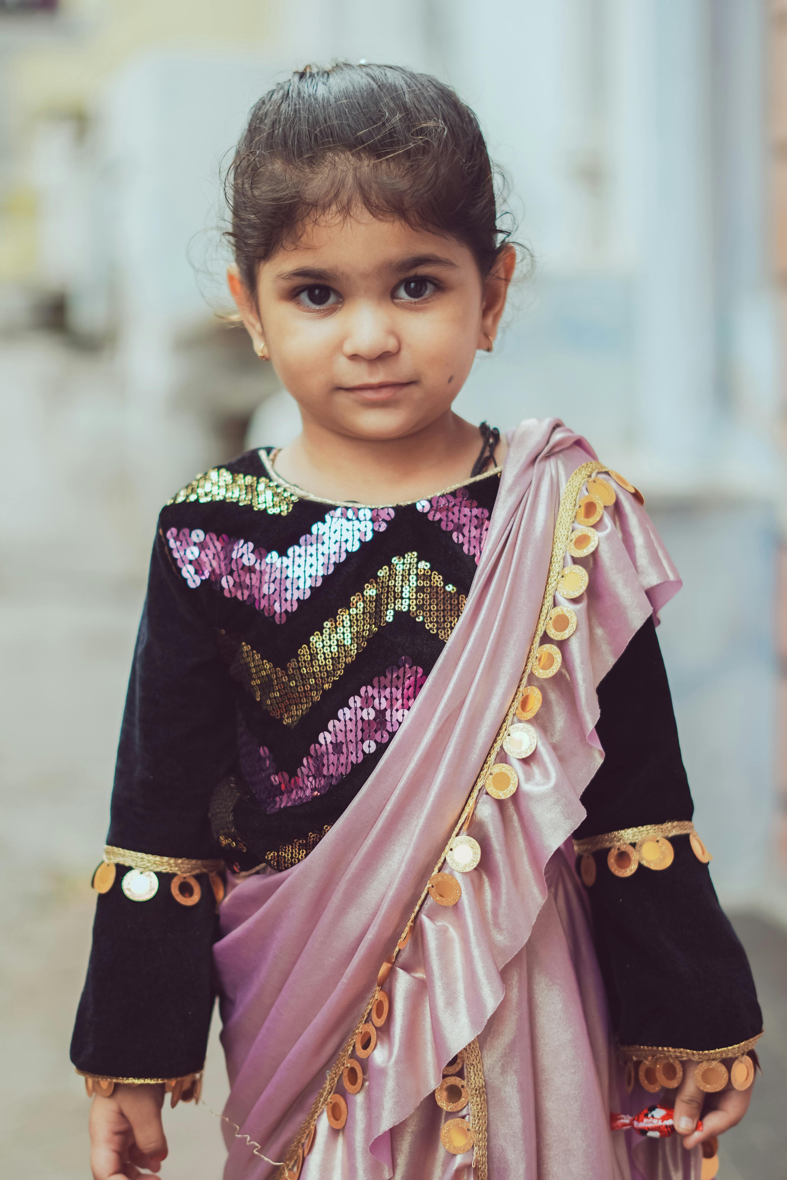 Close-Up Shot of a Girl in Traditional Clothing · Free Stock Photo