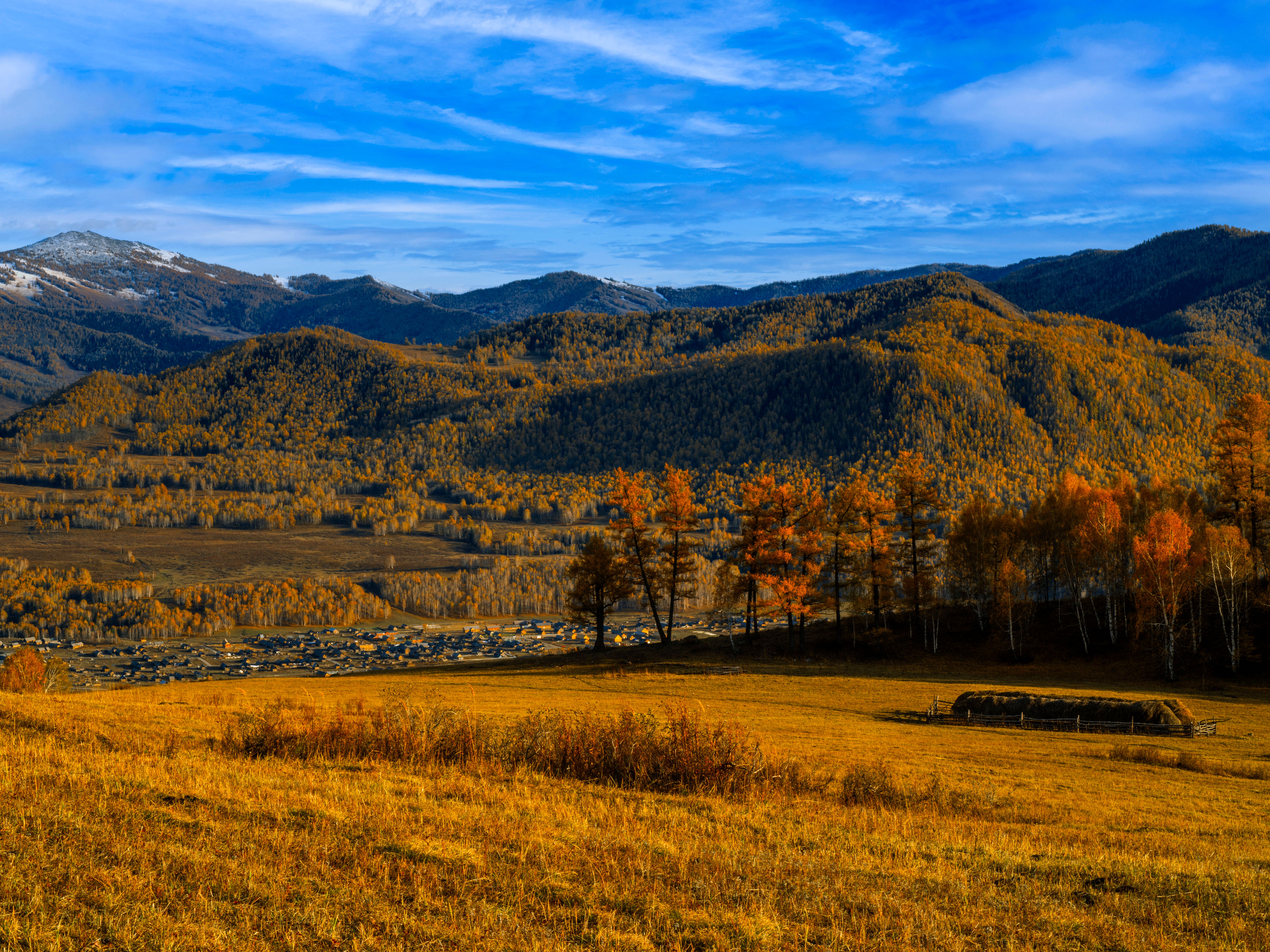 Grassland Near Green Mountains · Free Stock Photo