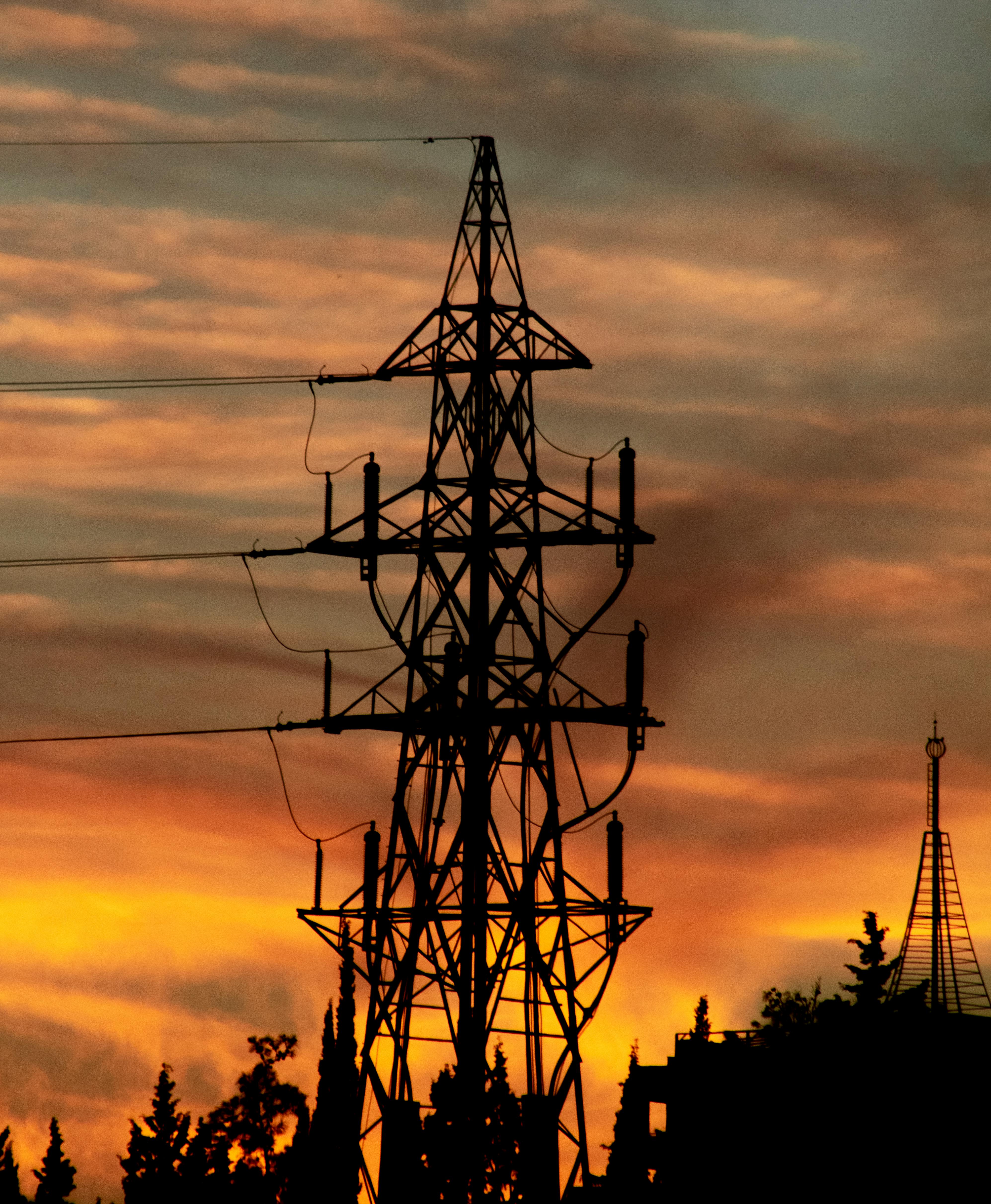 Silhouette of Electric Tower During Sunset · Free Stock Photo