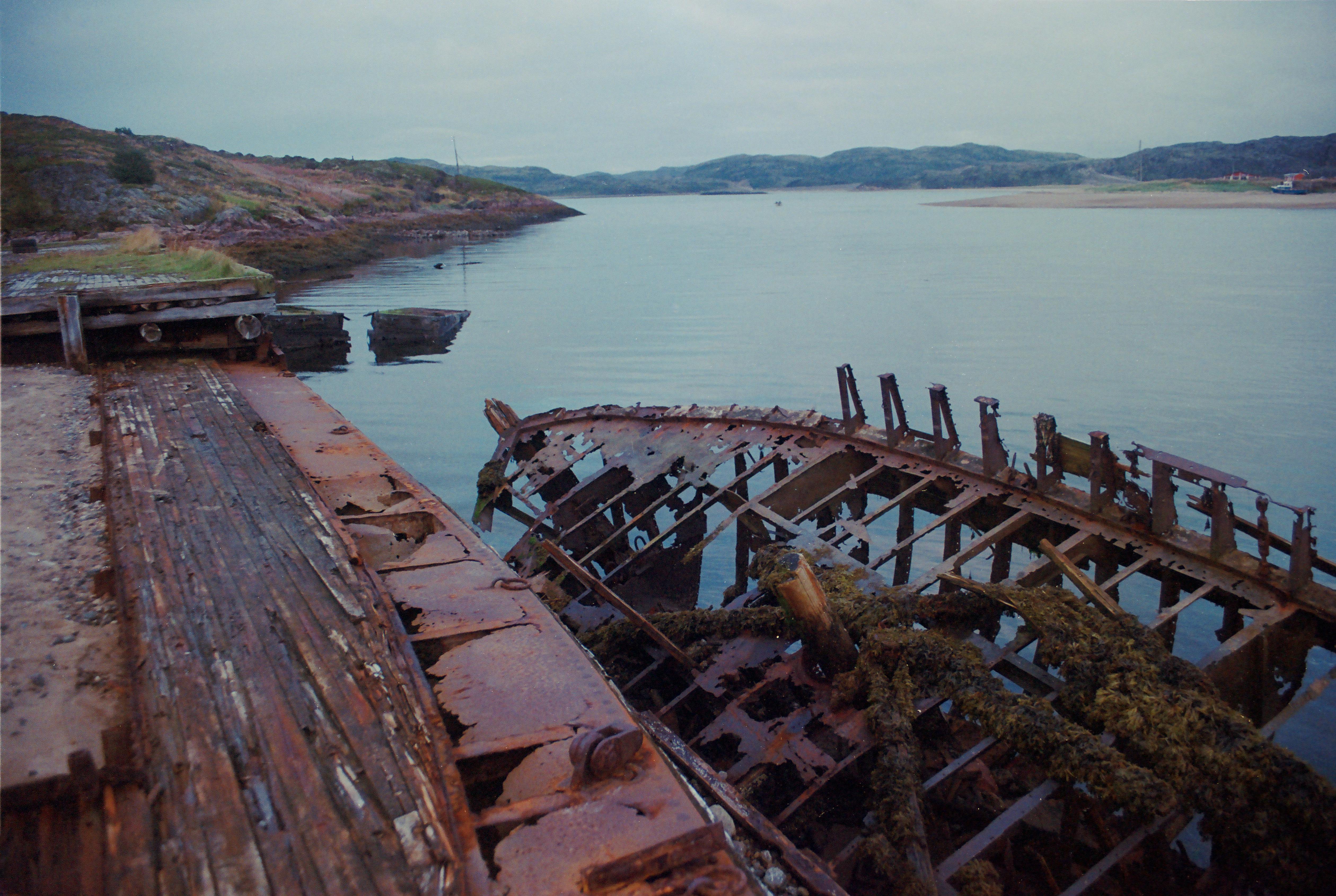 A Boat Wreck on a Lake · Free Stock Photo