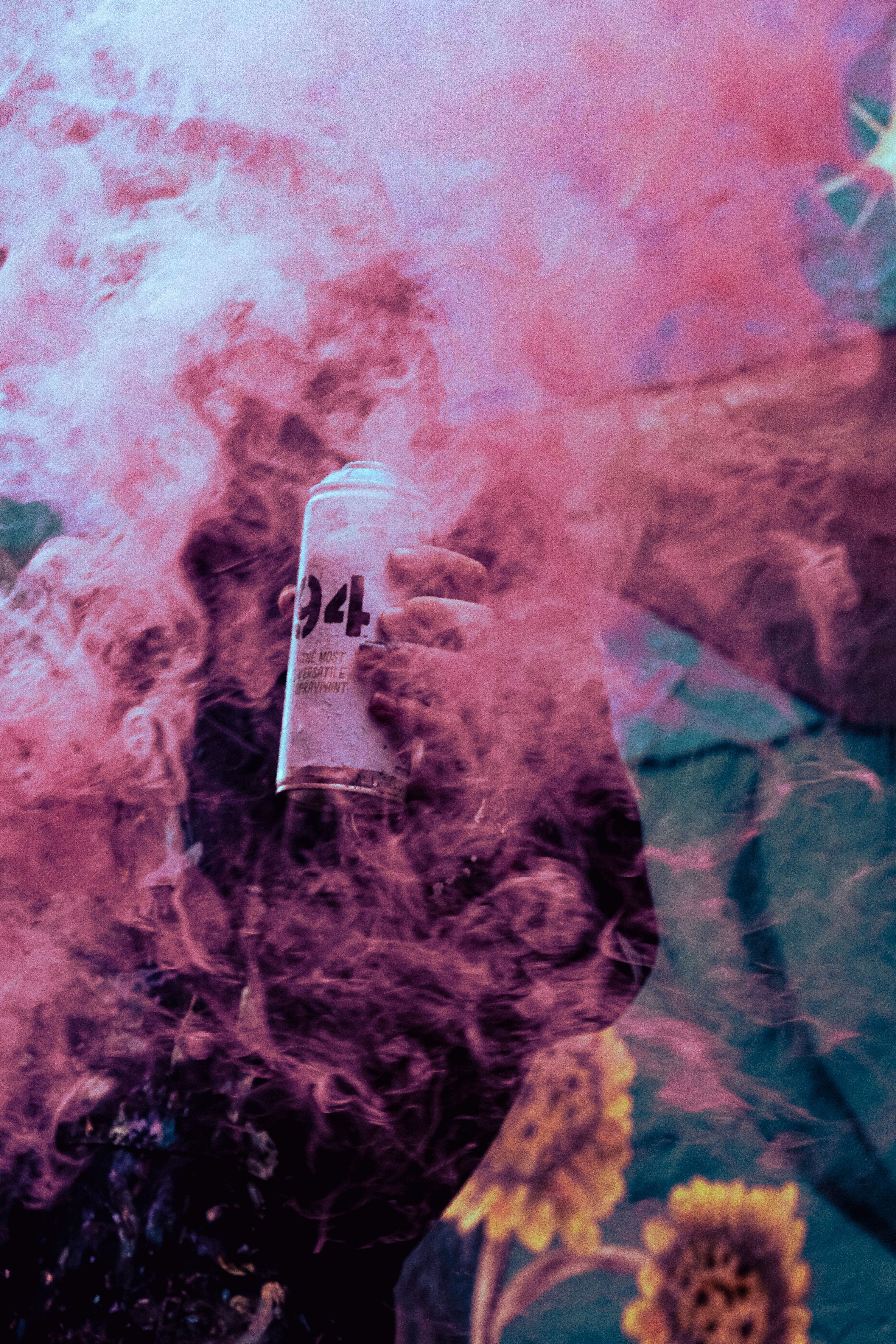 Person Spraying Spray Paint · Free Stock Photo