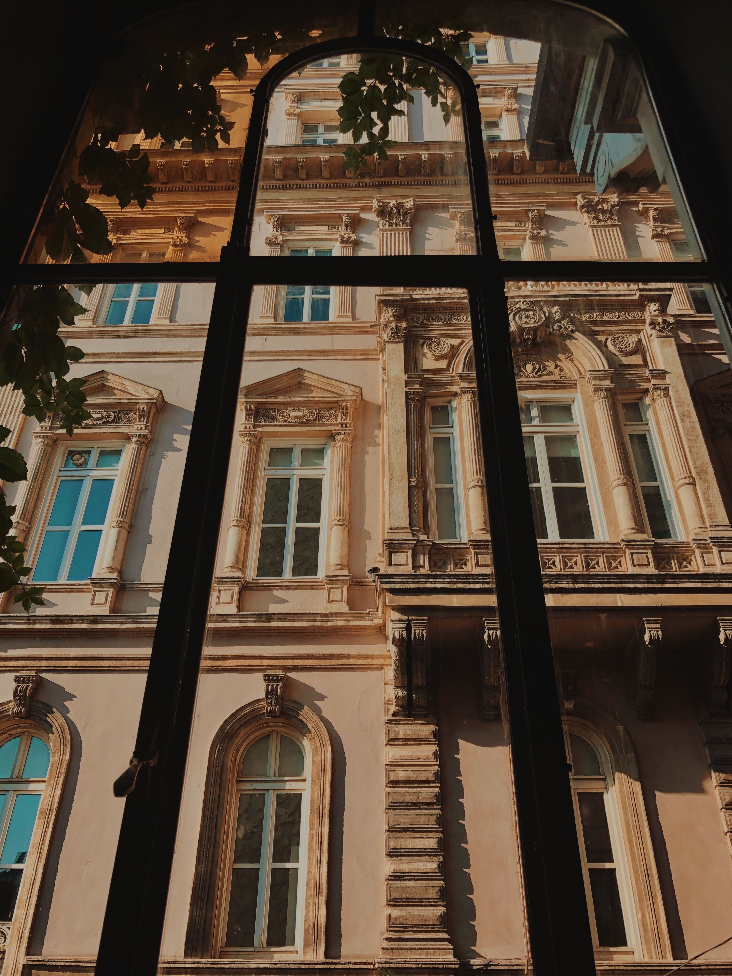 A Low Angle Shot of a Concrete Building with Glass Windows · Free Stock ...