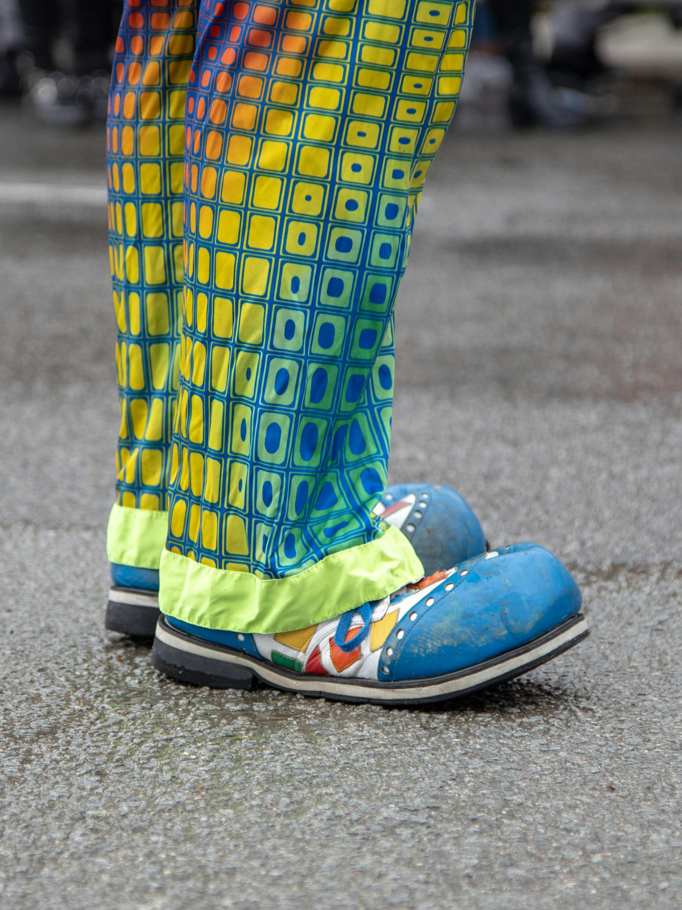 Person Wearing a Blue Oversized Shoes · Free Stock Photo