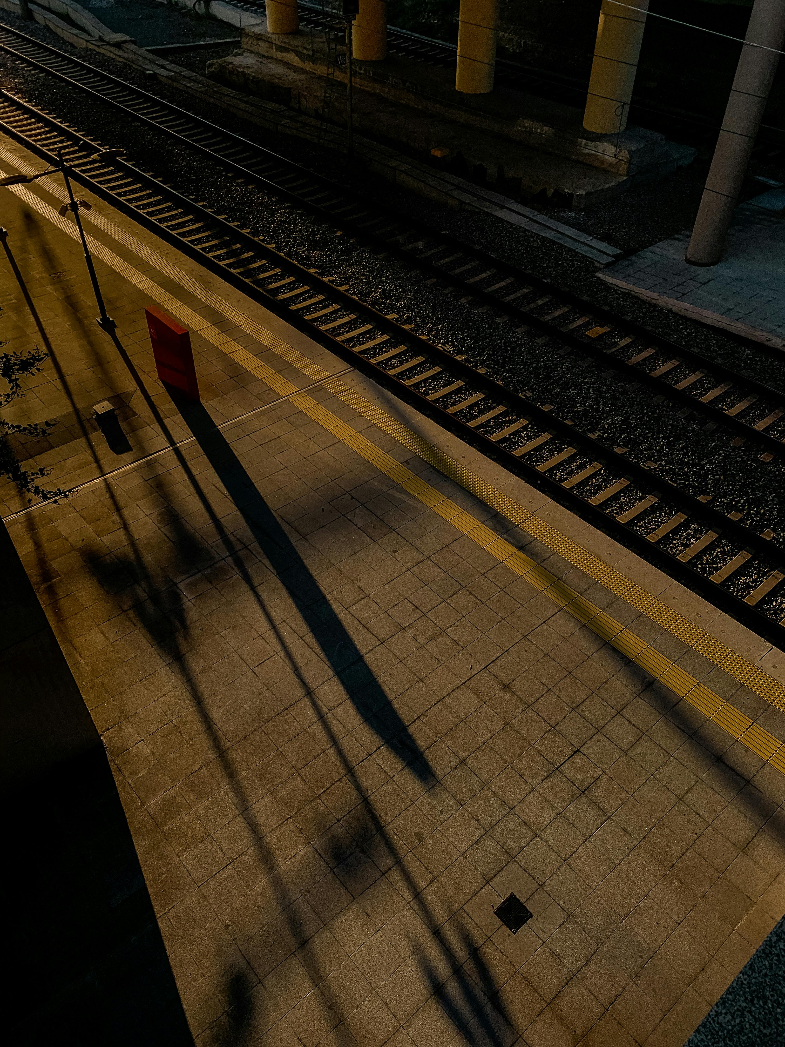 Railway Track Split in Black and White · Free Stock Photo