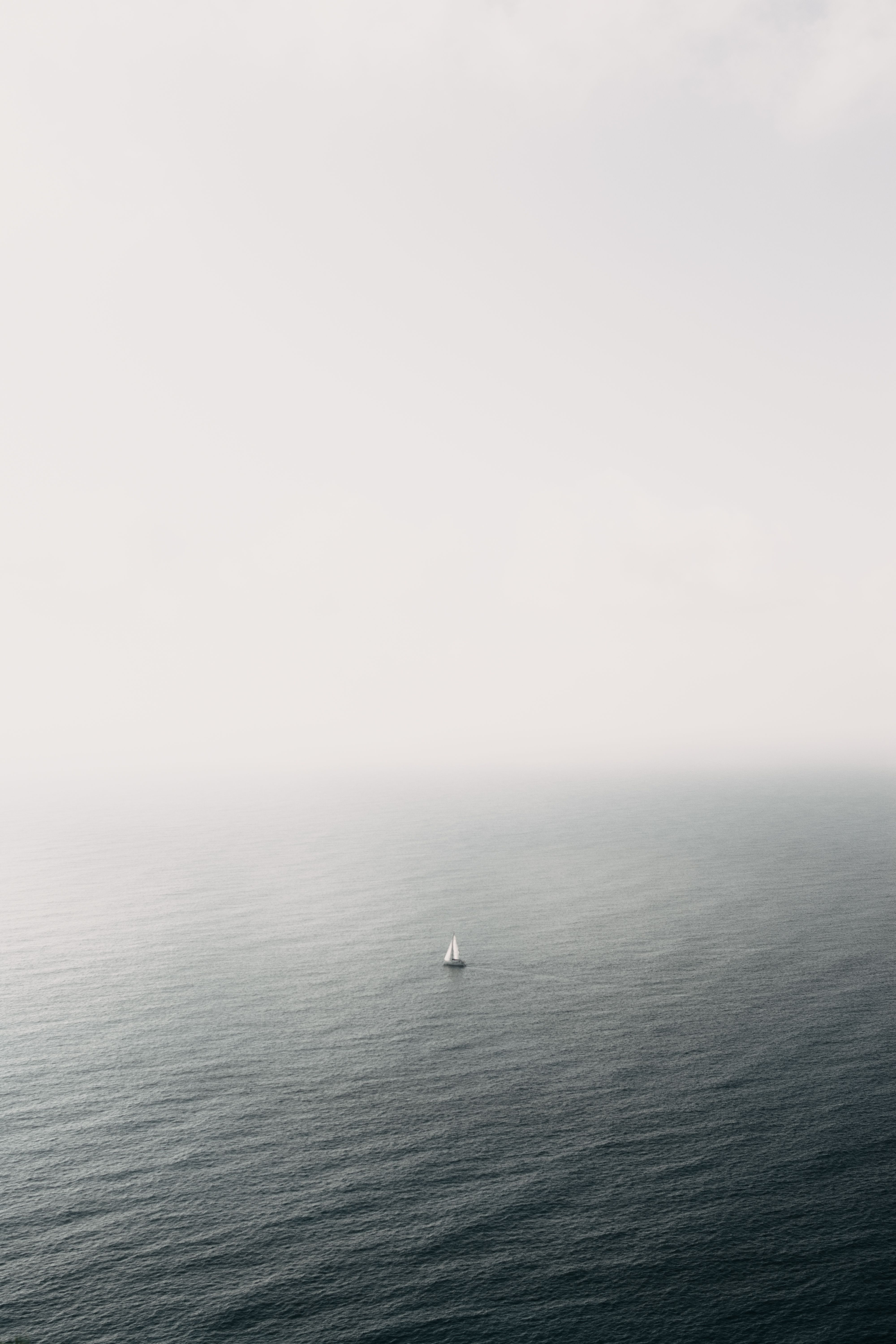 Grayscale Photo of An Island On A Foggy Day · Free Stock Photo
