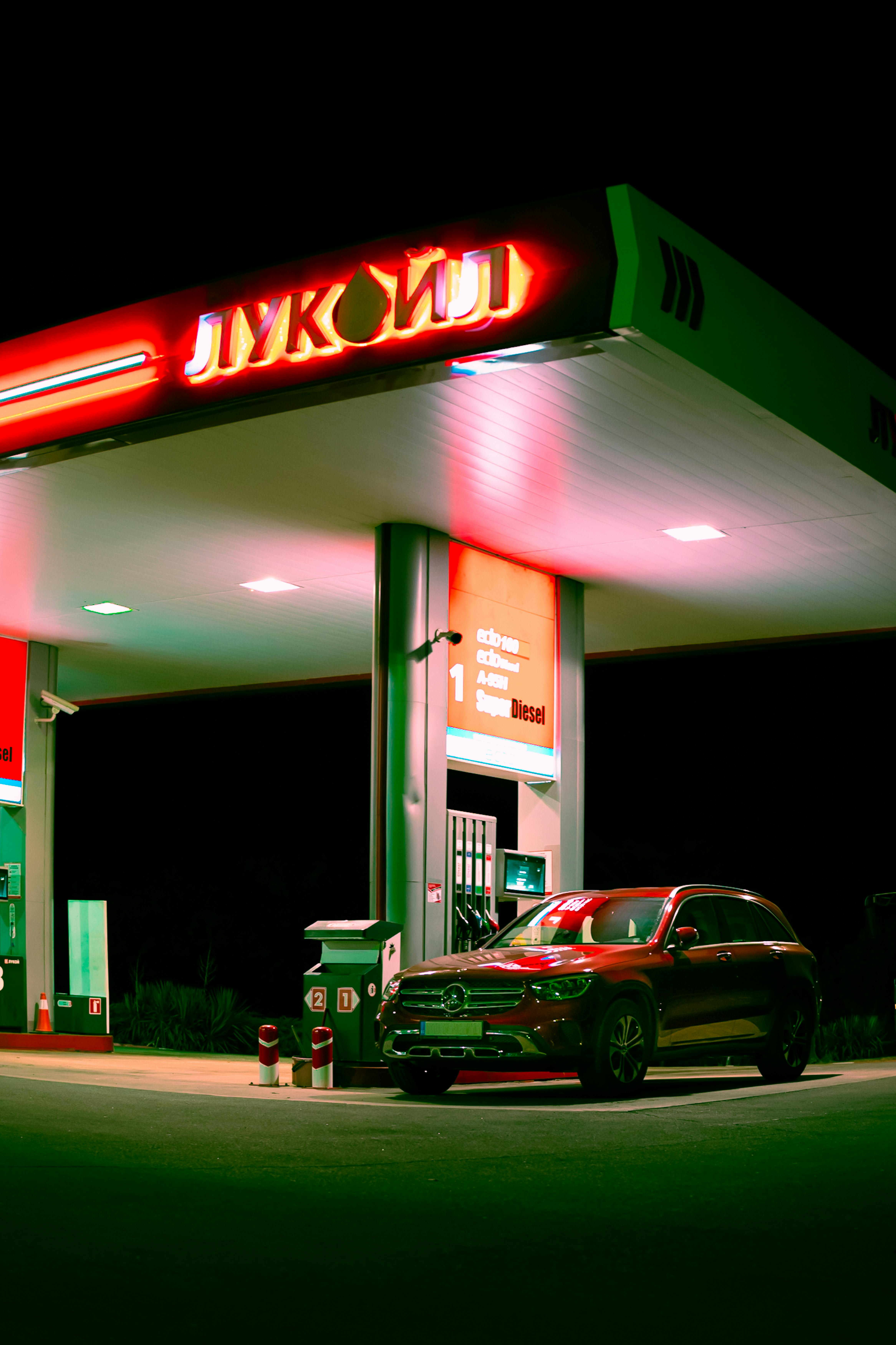 A Car at a Gas Station · Free Stock Photo
