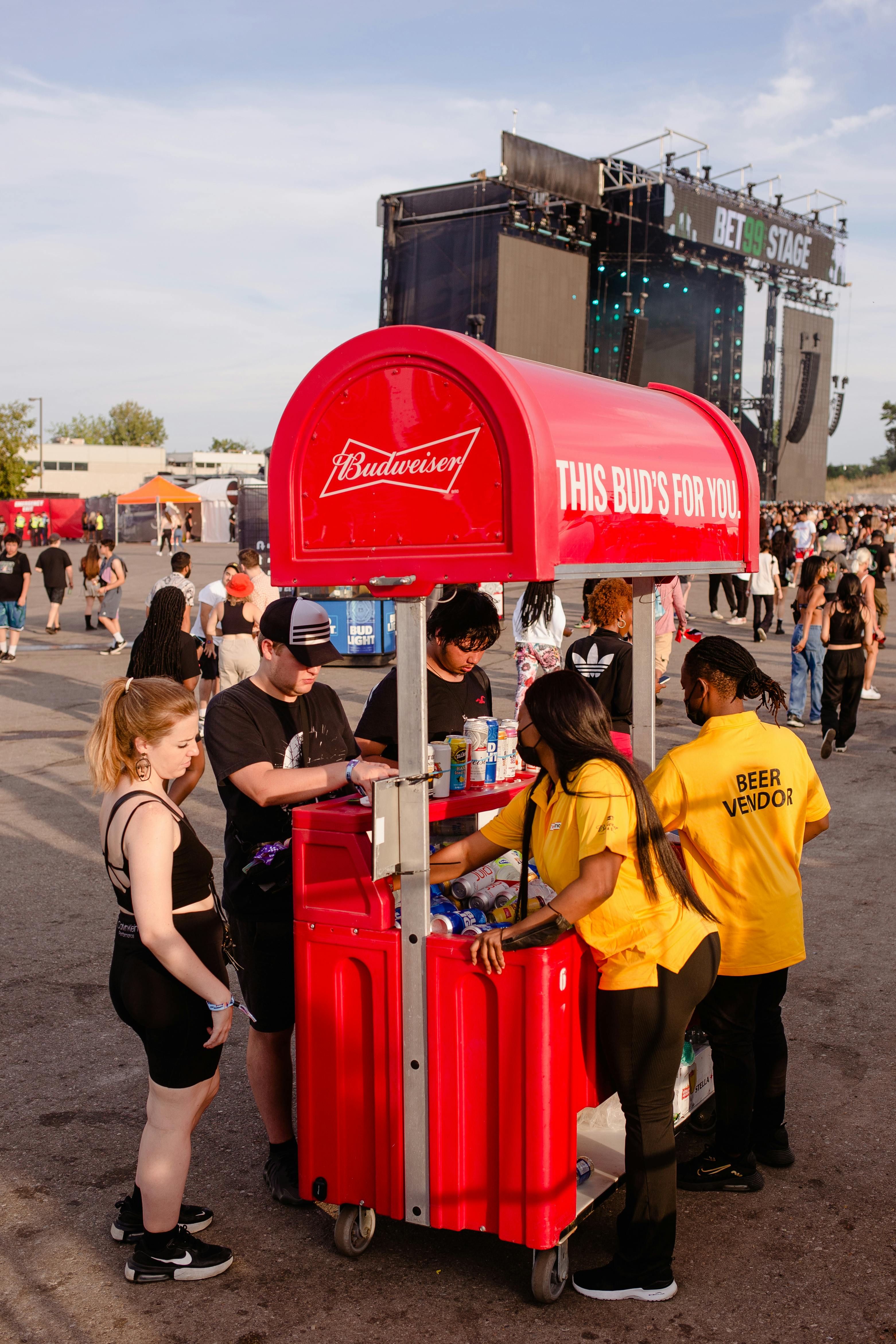 People by Food Stand at Concert · Free Stock Photo