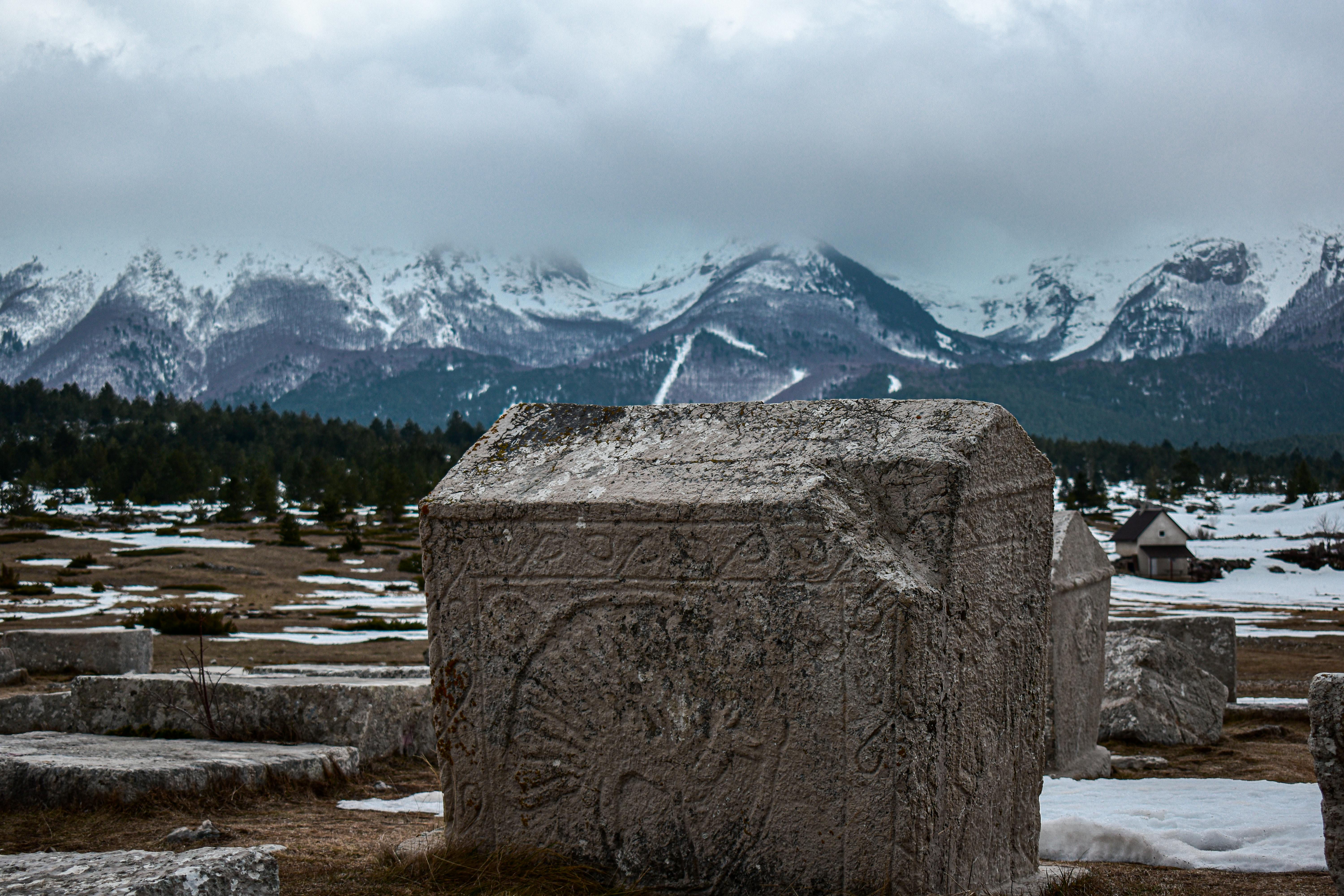 Stone Markers in an Ancient Cemetery · Free Stock Photo