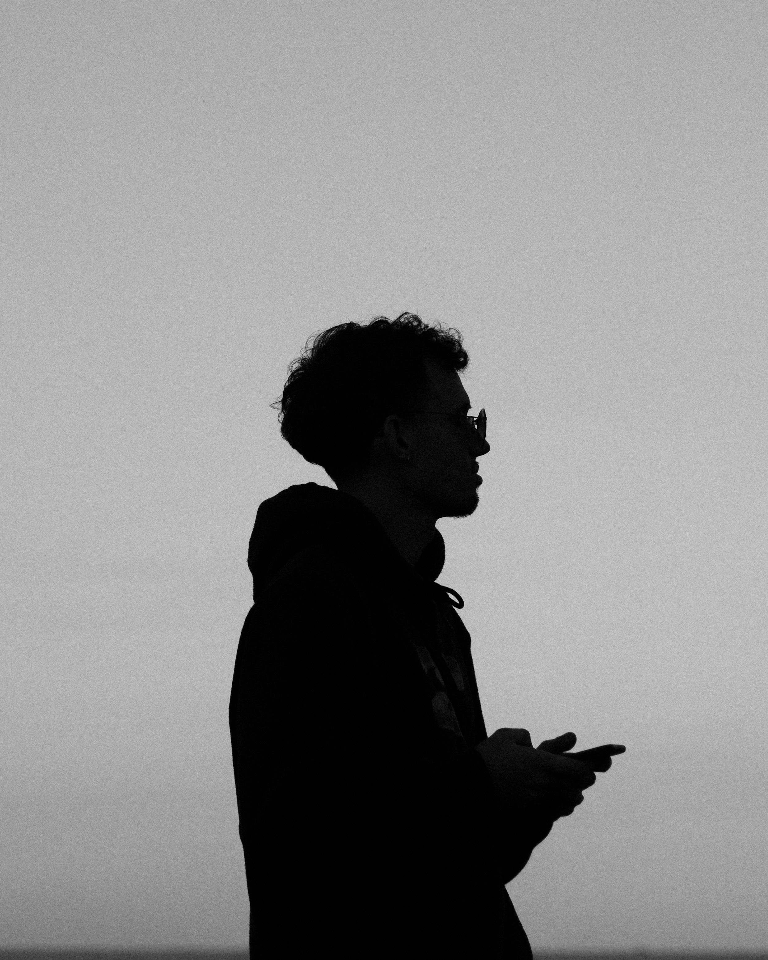 Person Walking On Stairs In Greyscale Photograph · Free Stock Photo