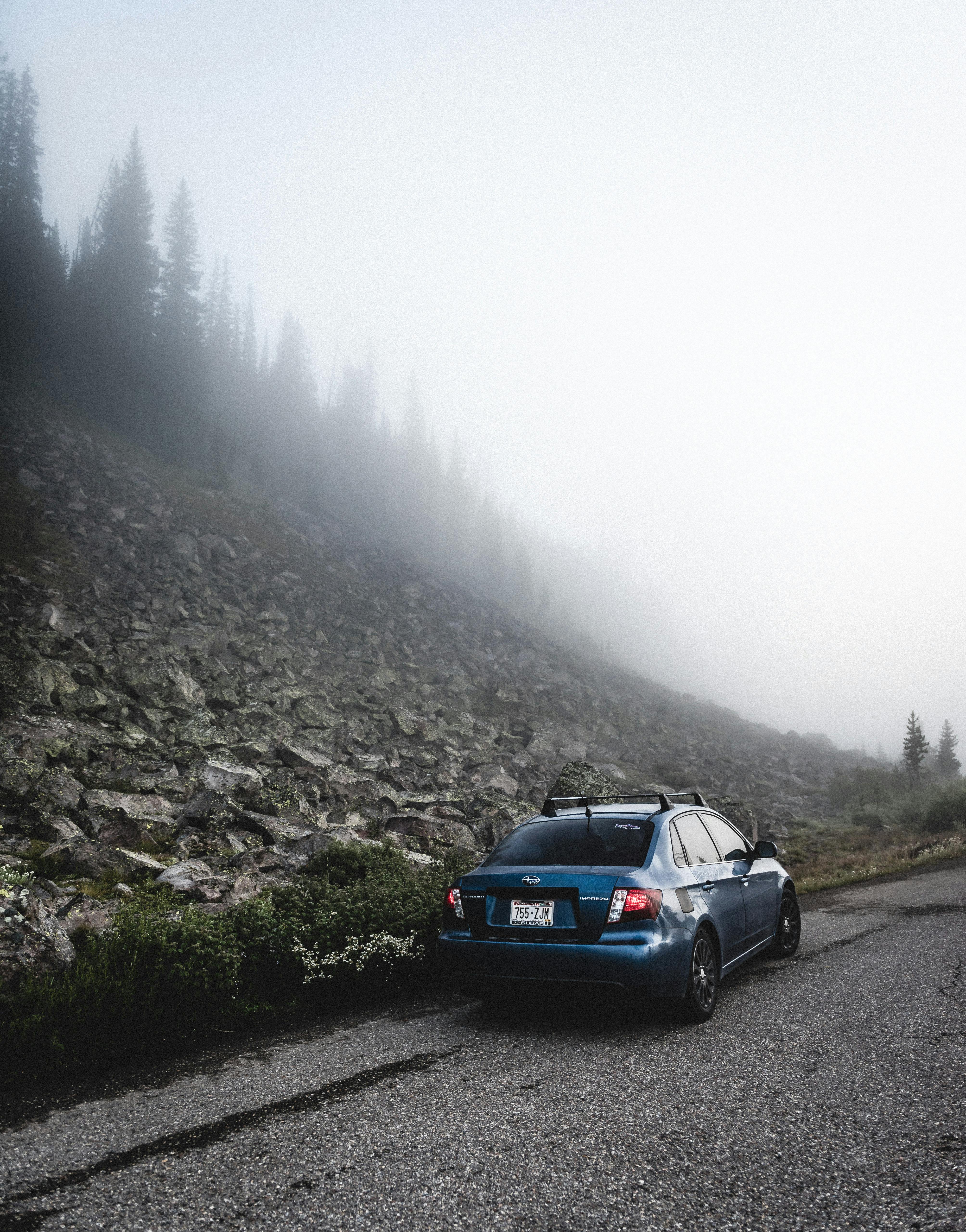 Blue Car on the Road · Free Stock Photo