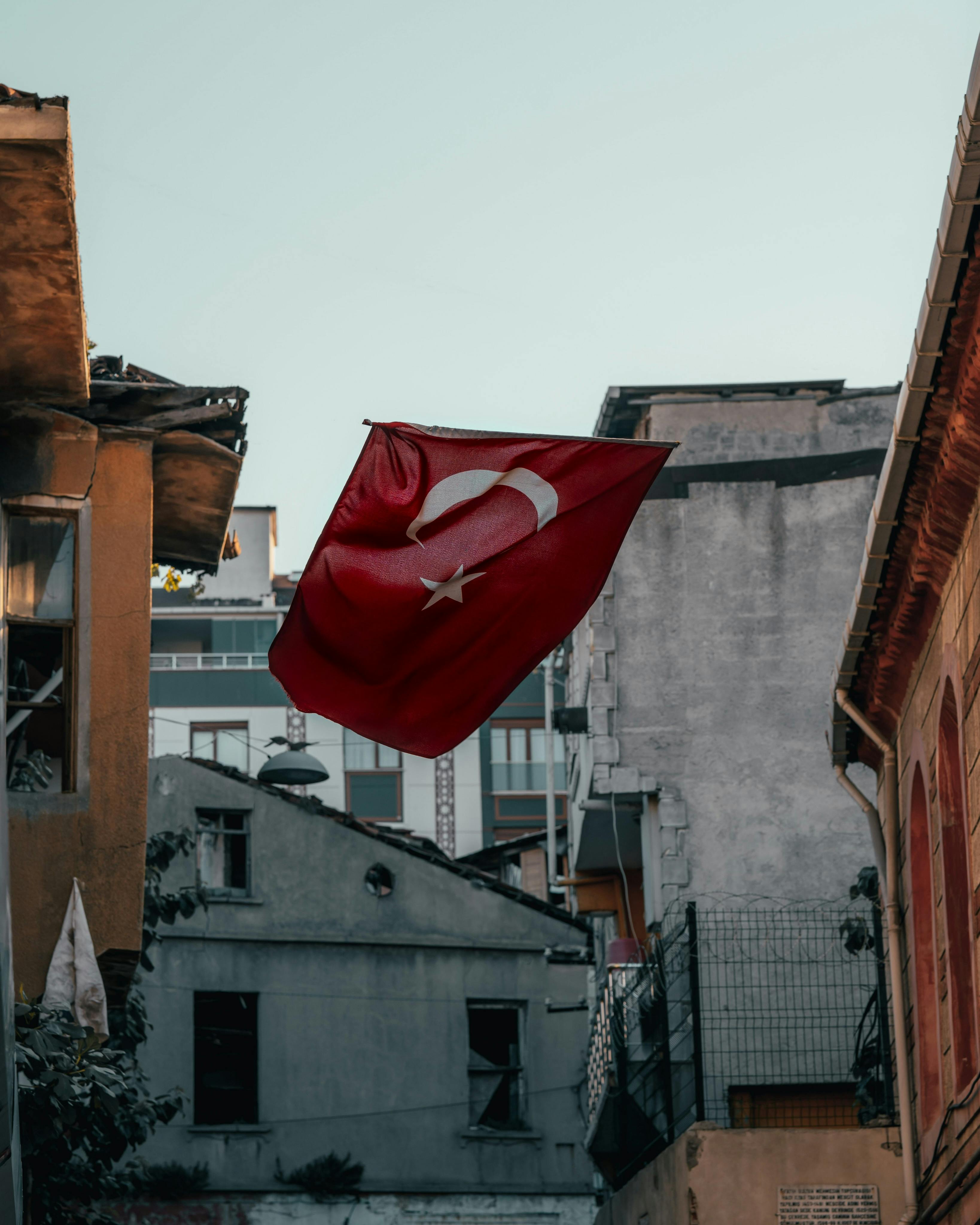 Flags Hanging on the Street · Free Stock Photo