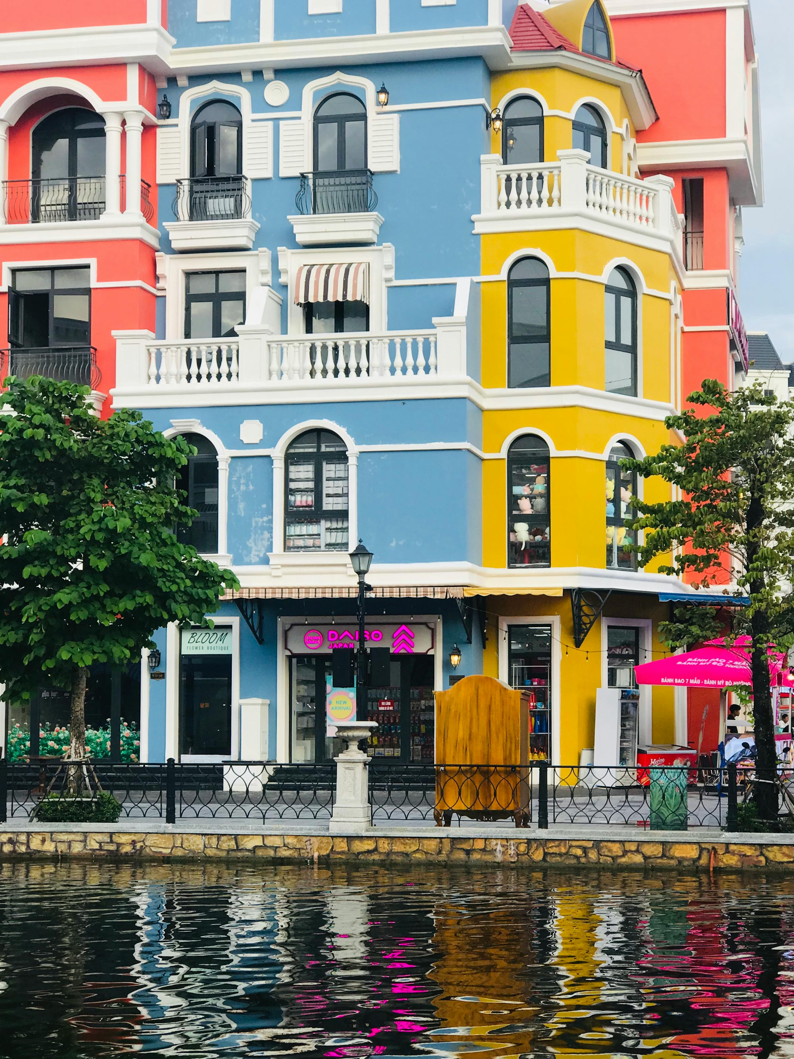 Colorful Buildings Beside the River · Free Stock Photo