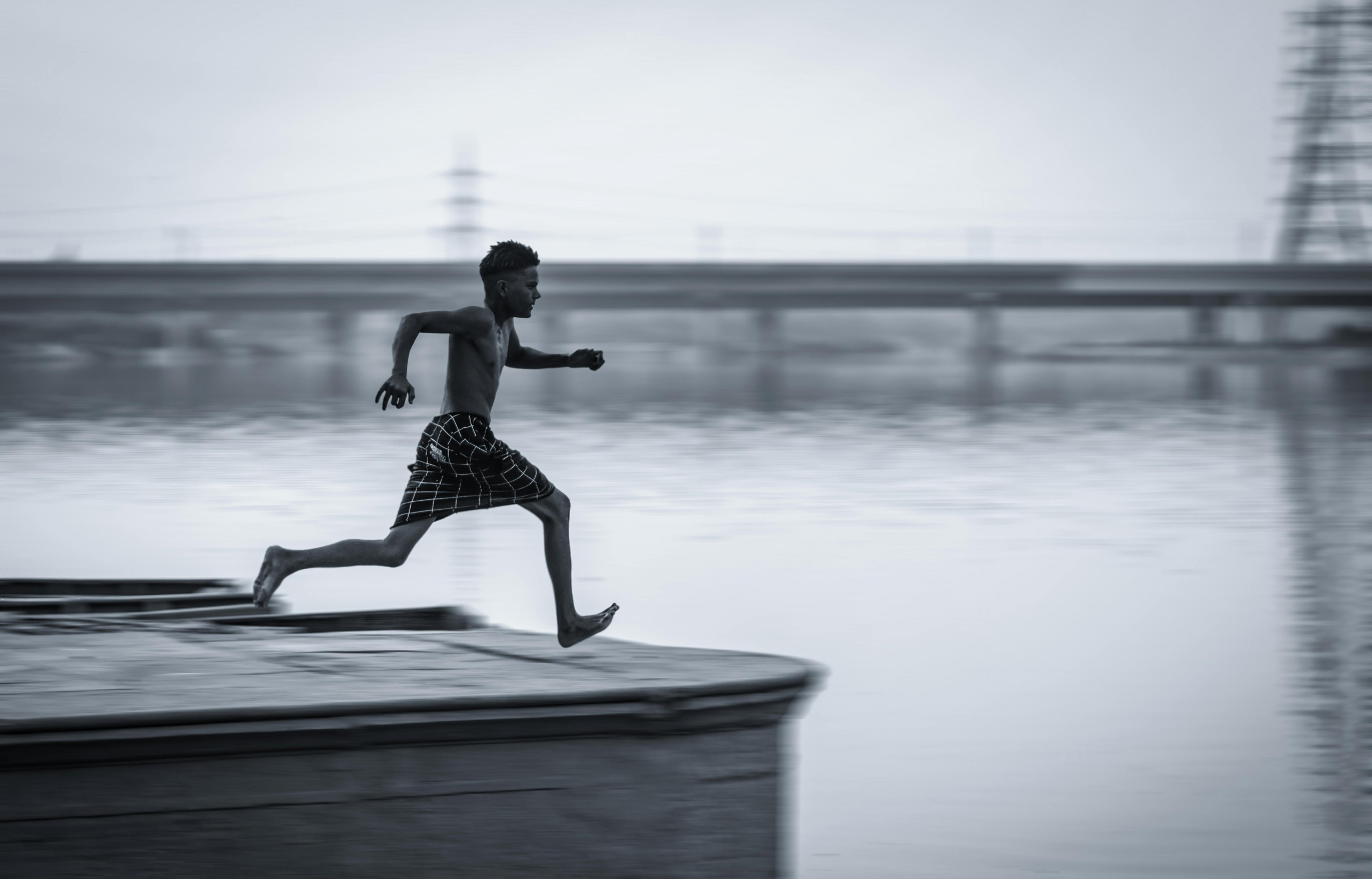 Man Running towards River · Free Stock Photo