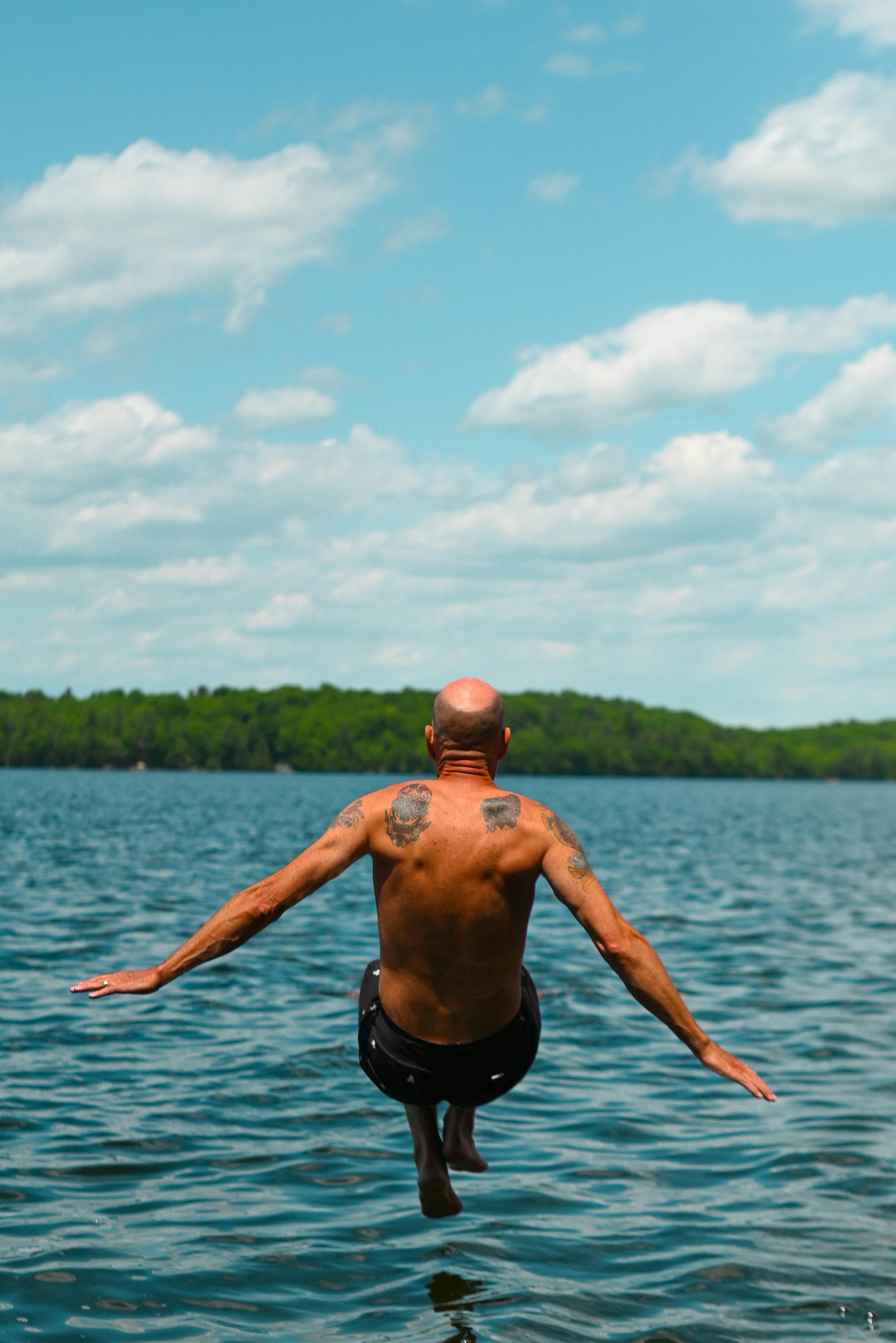 Photo of Man Jumping into the Water · Free Stock Photo