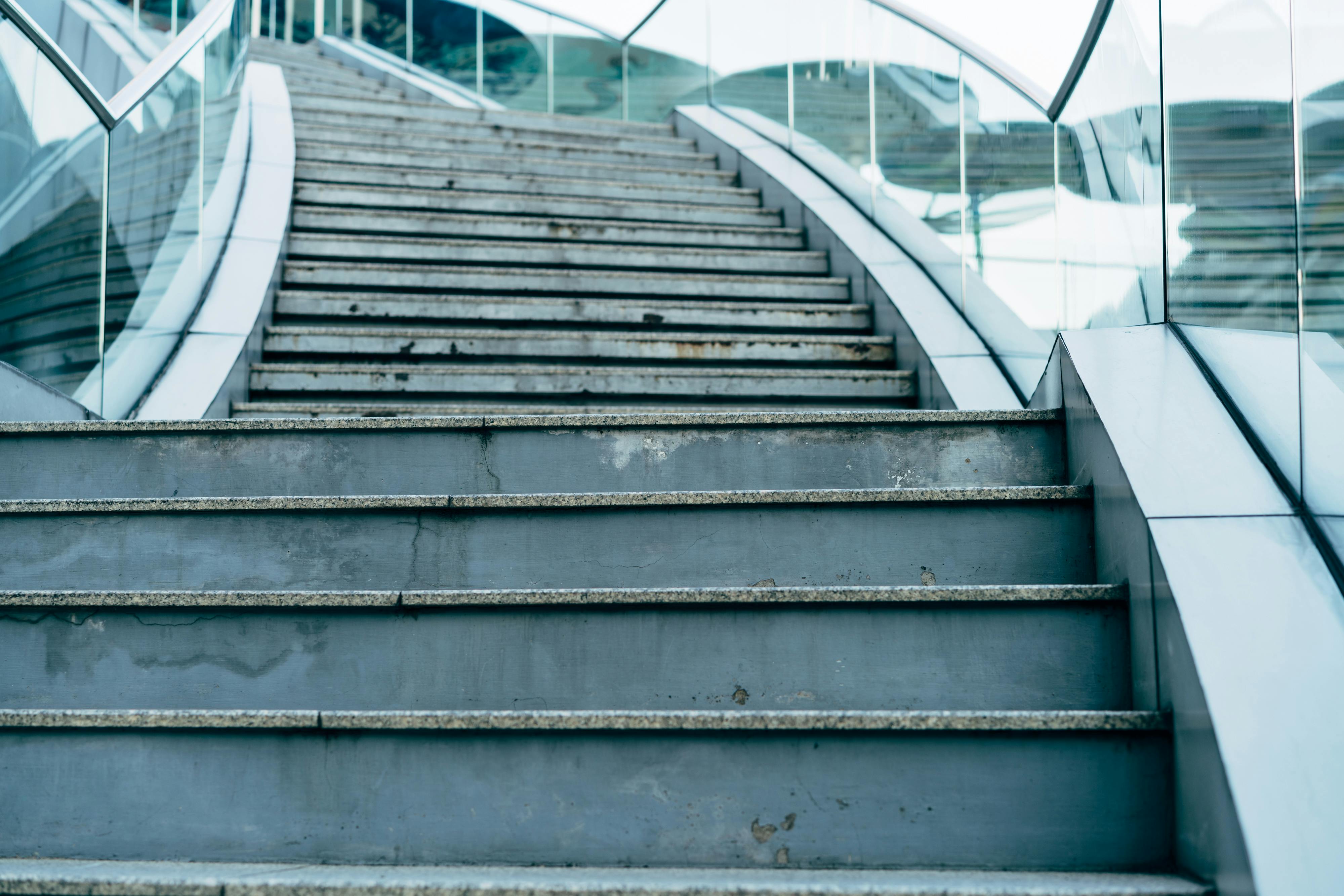 A Modern Staircase with Glass Railing · Free Stock Photo