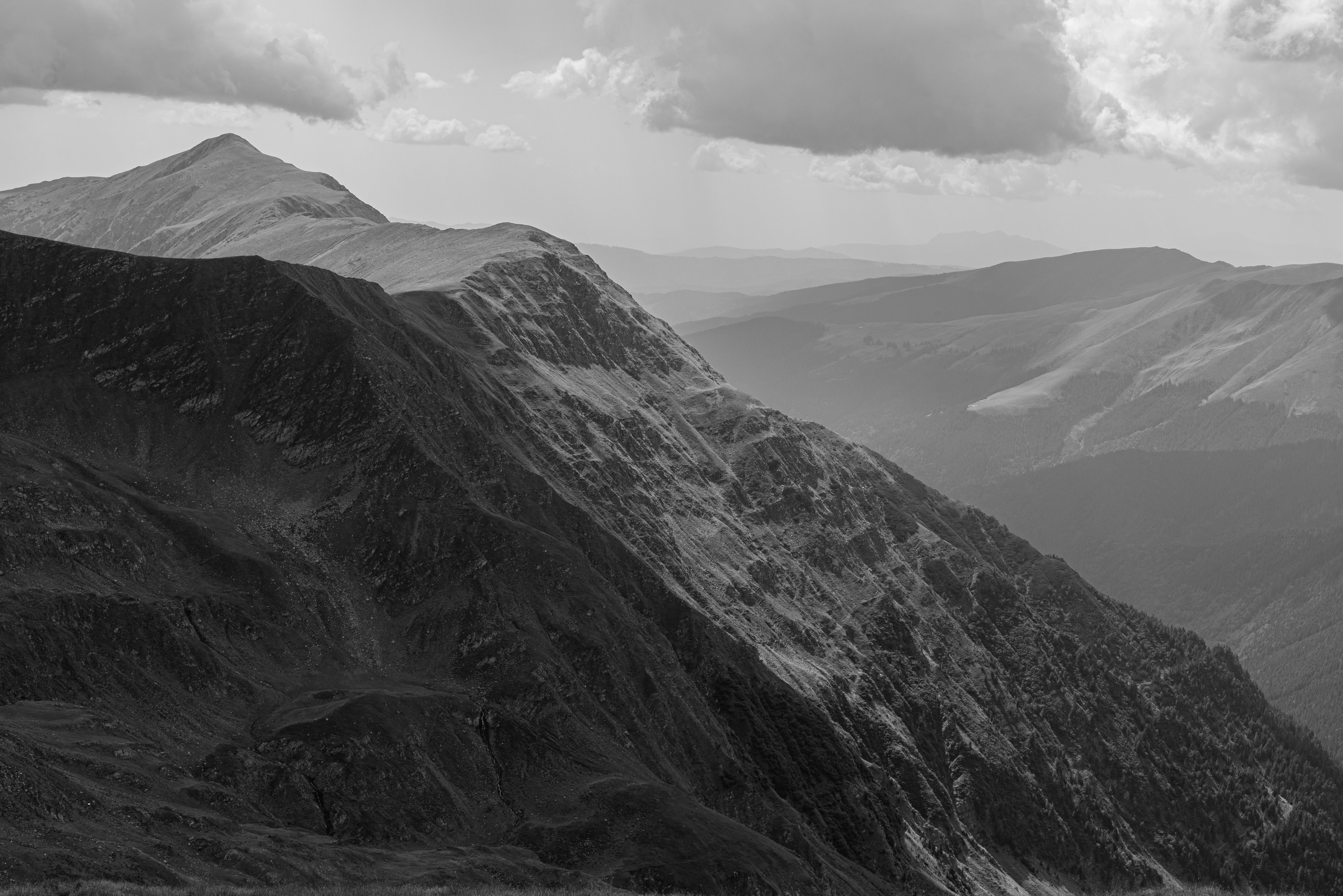 Grayscale Photo of Mountain Range · Free Stock Photo