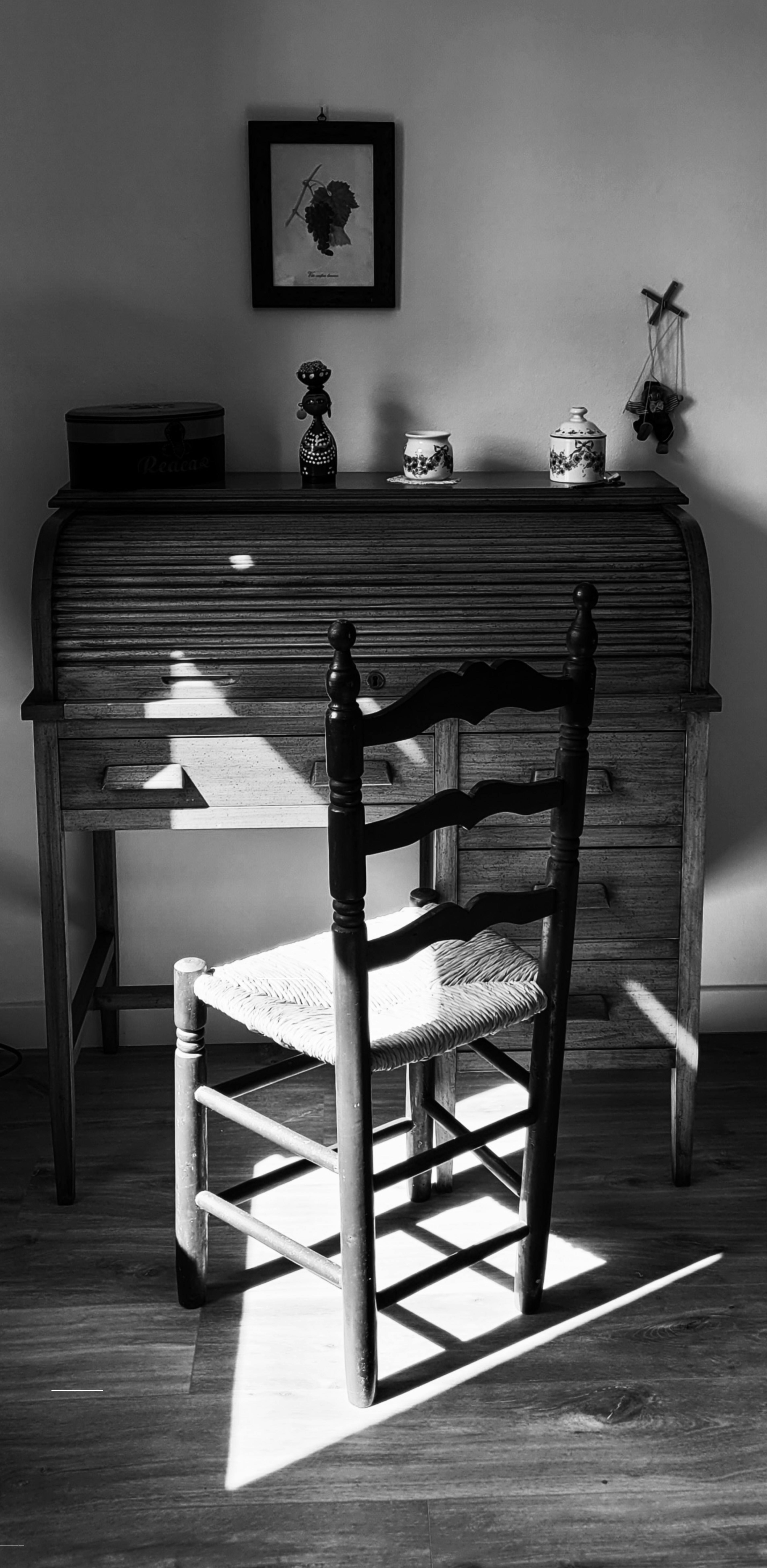 Monochrome Photo of an Empty Wooden Chair · Free Stock Photo