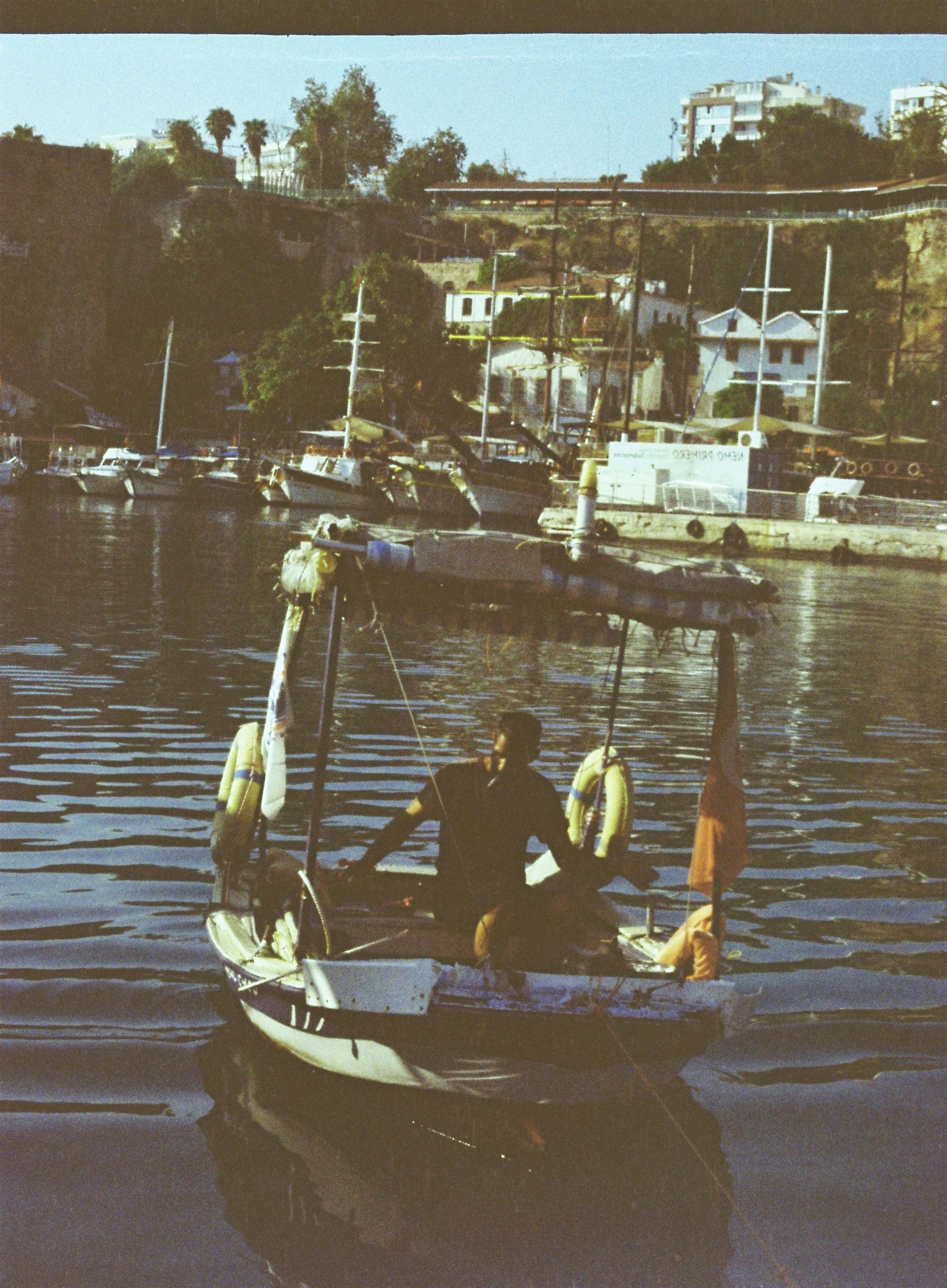 A Man Riding on a Boat · Free Stock Photo