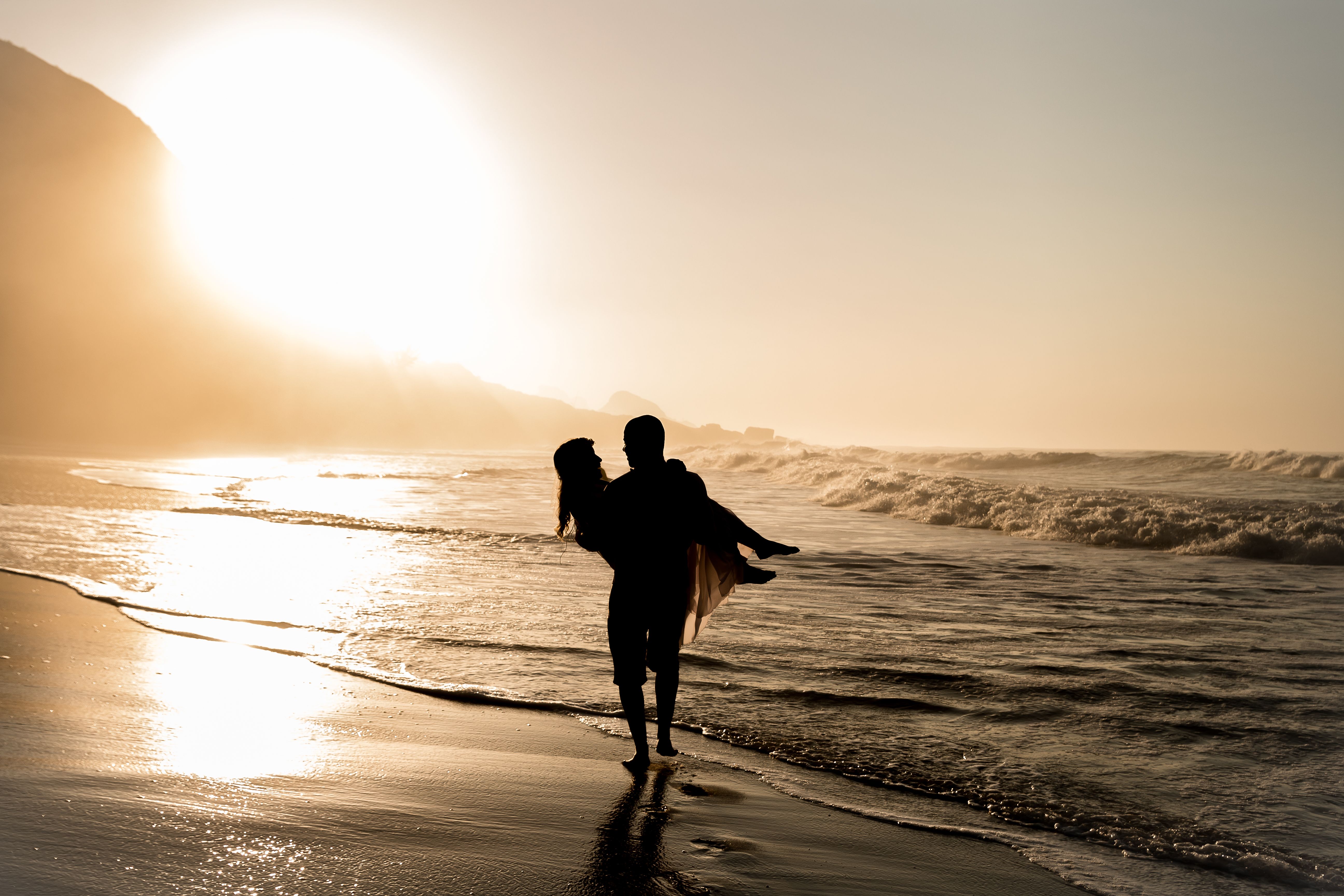 Couple Standing together on the Beach · Free Stock Photo