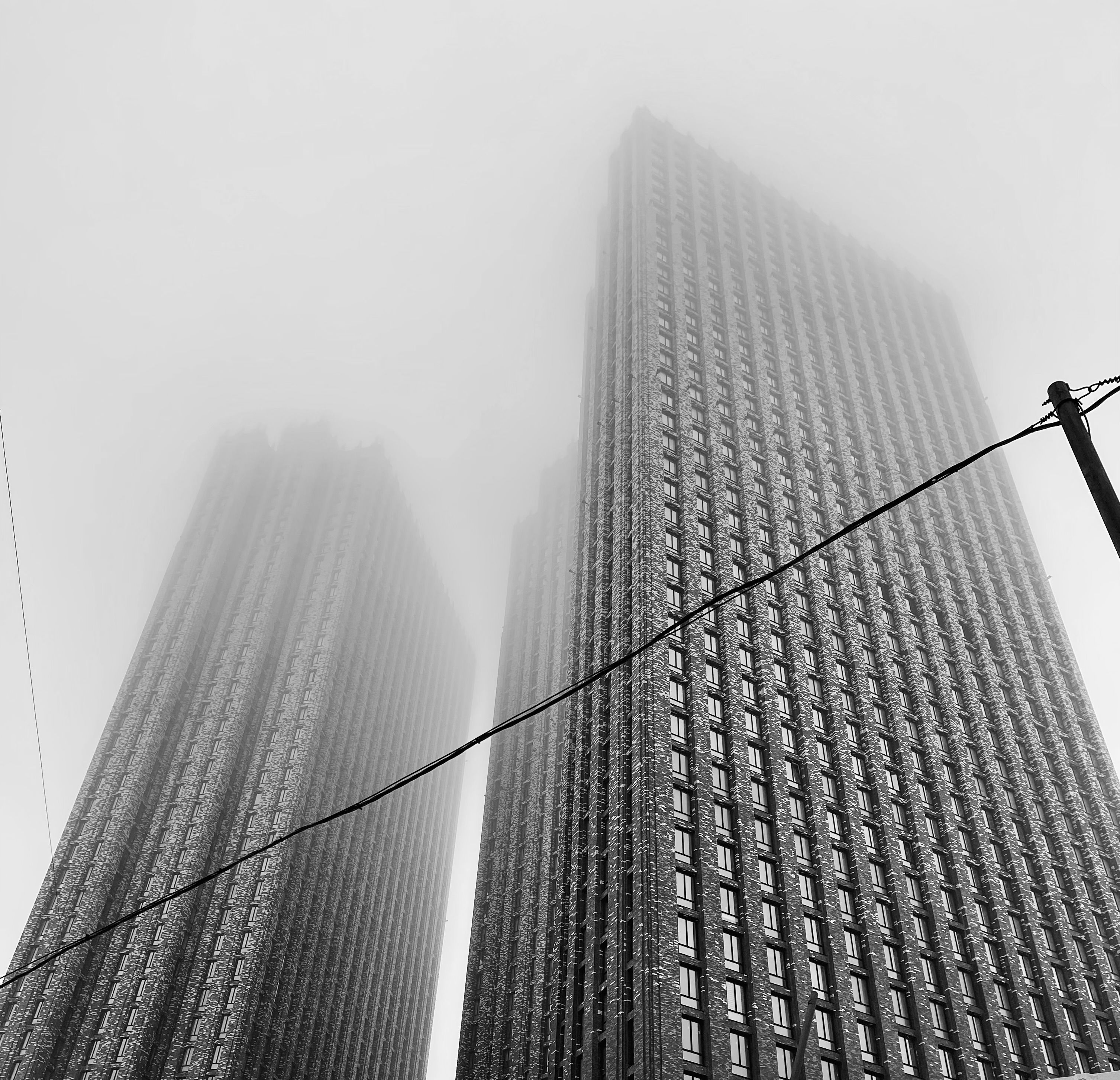 Skyscrapers in Snow on Sky Background · Free Stock Photo