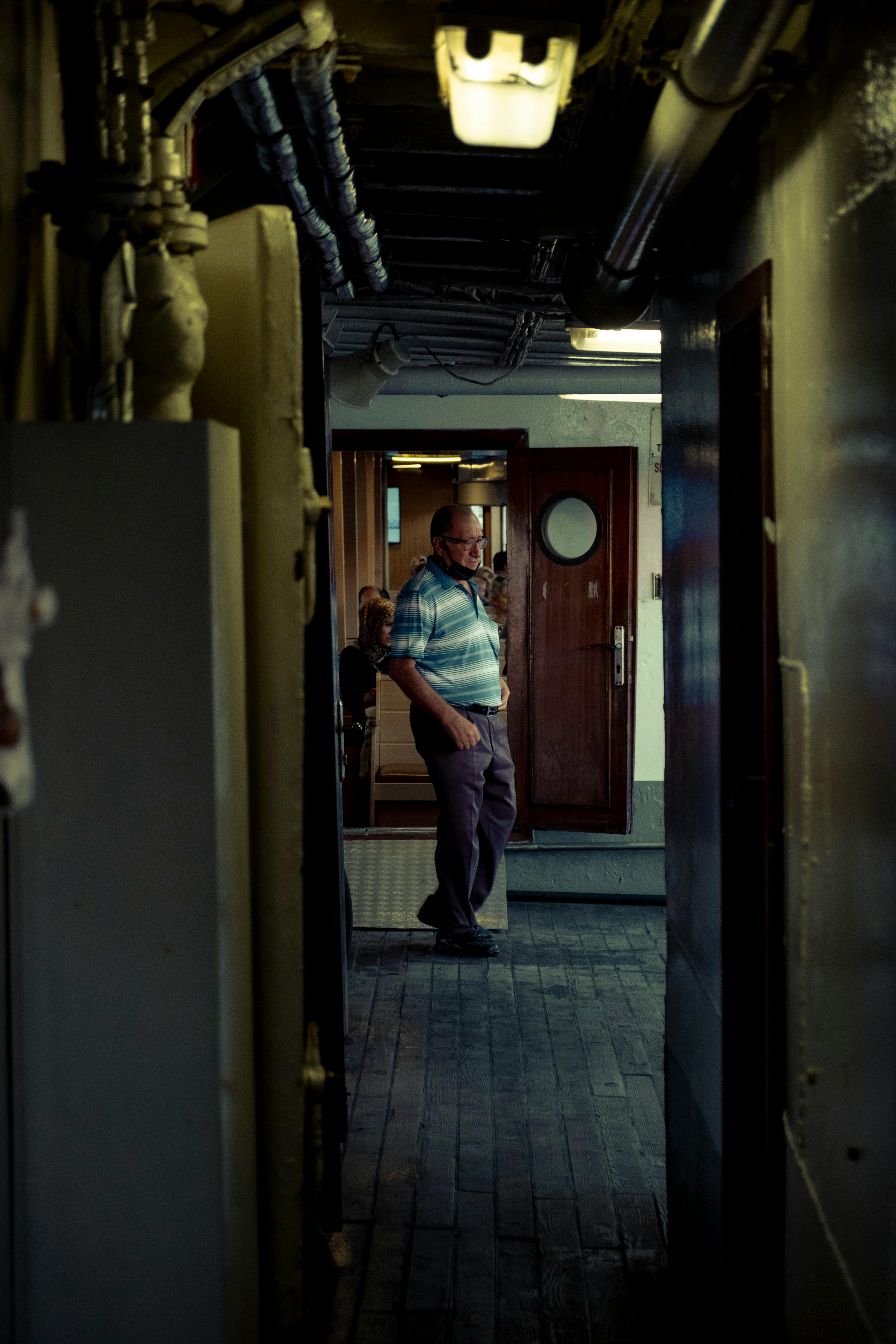 Man Standing Inside a Building · Free Stock Photo