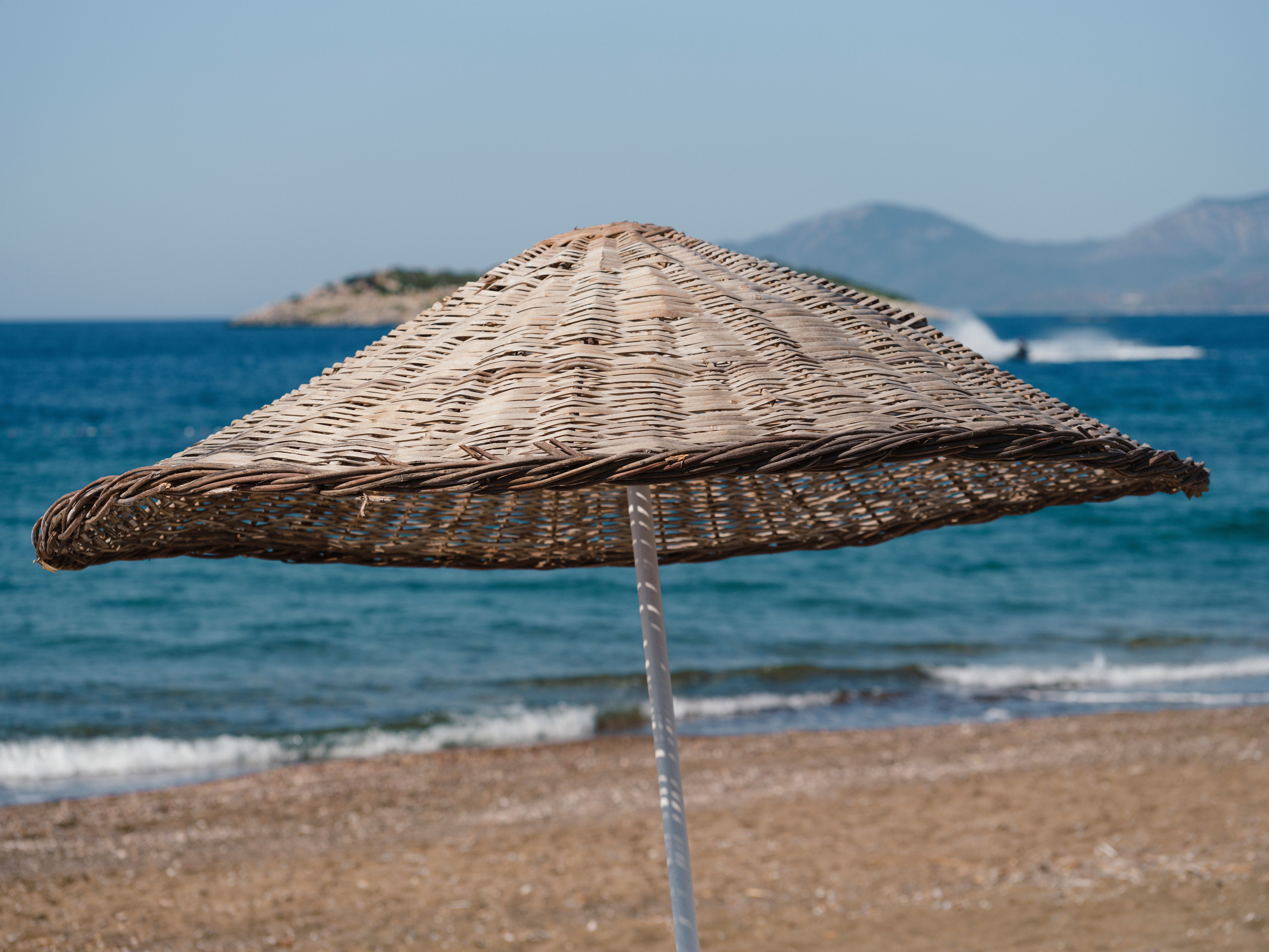 Straw Umbrella on the Beach · Free Stock Photo