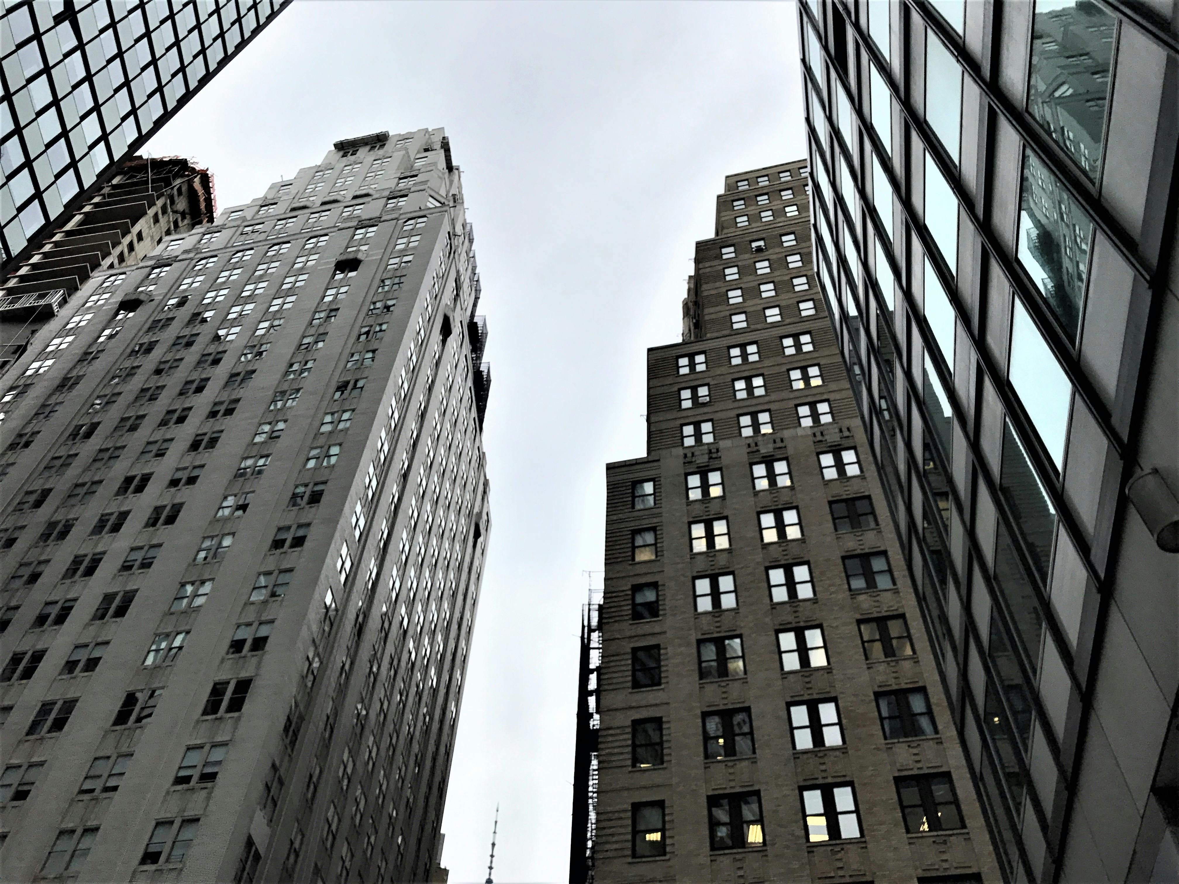 Low-Angle Shot of High Rise Buildings · Free Stock Photo
