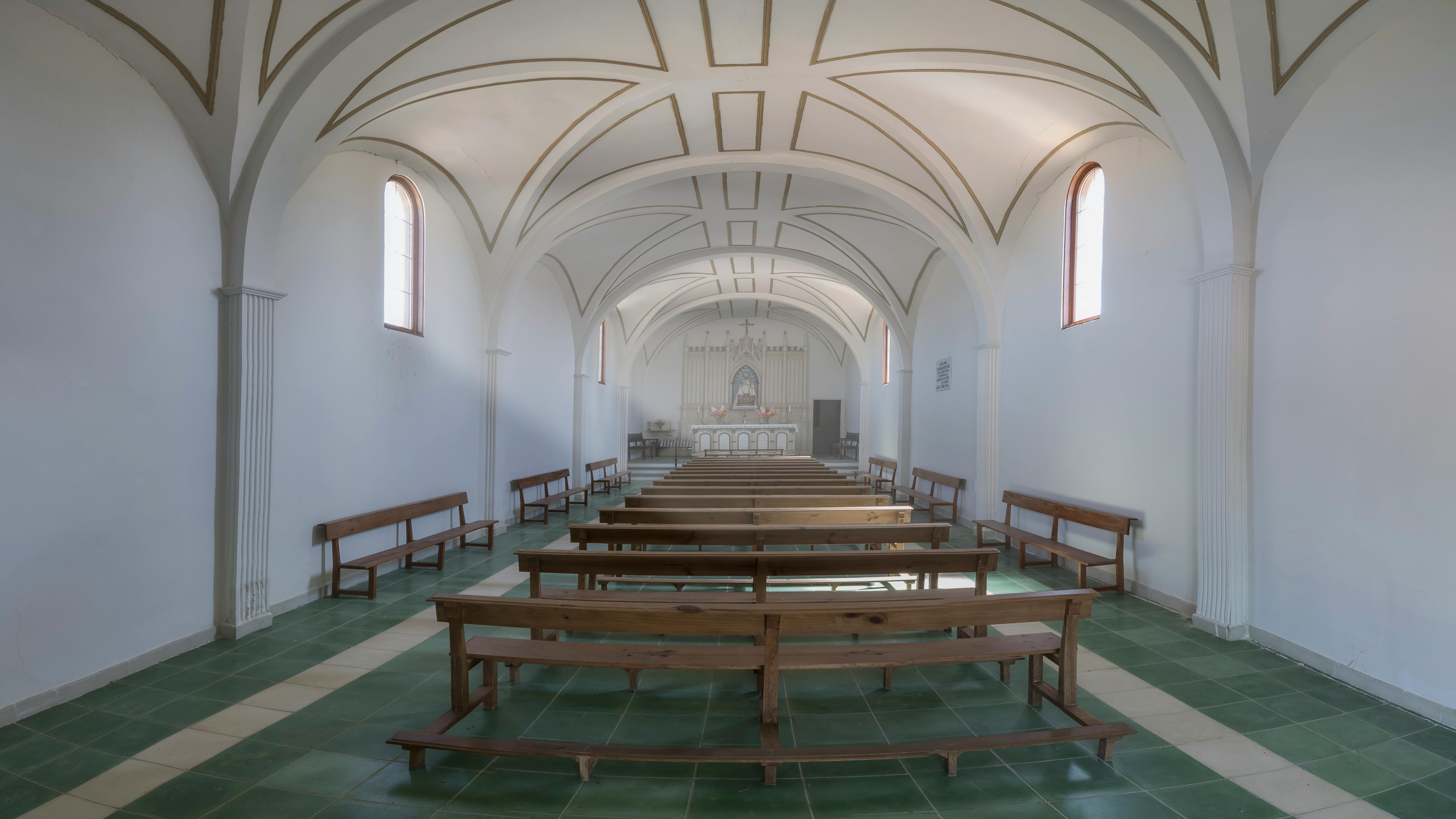 Church with Wooden Benches Arched Windows · Free Stock Photo