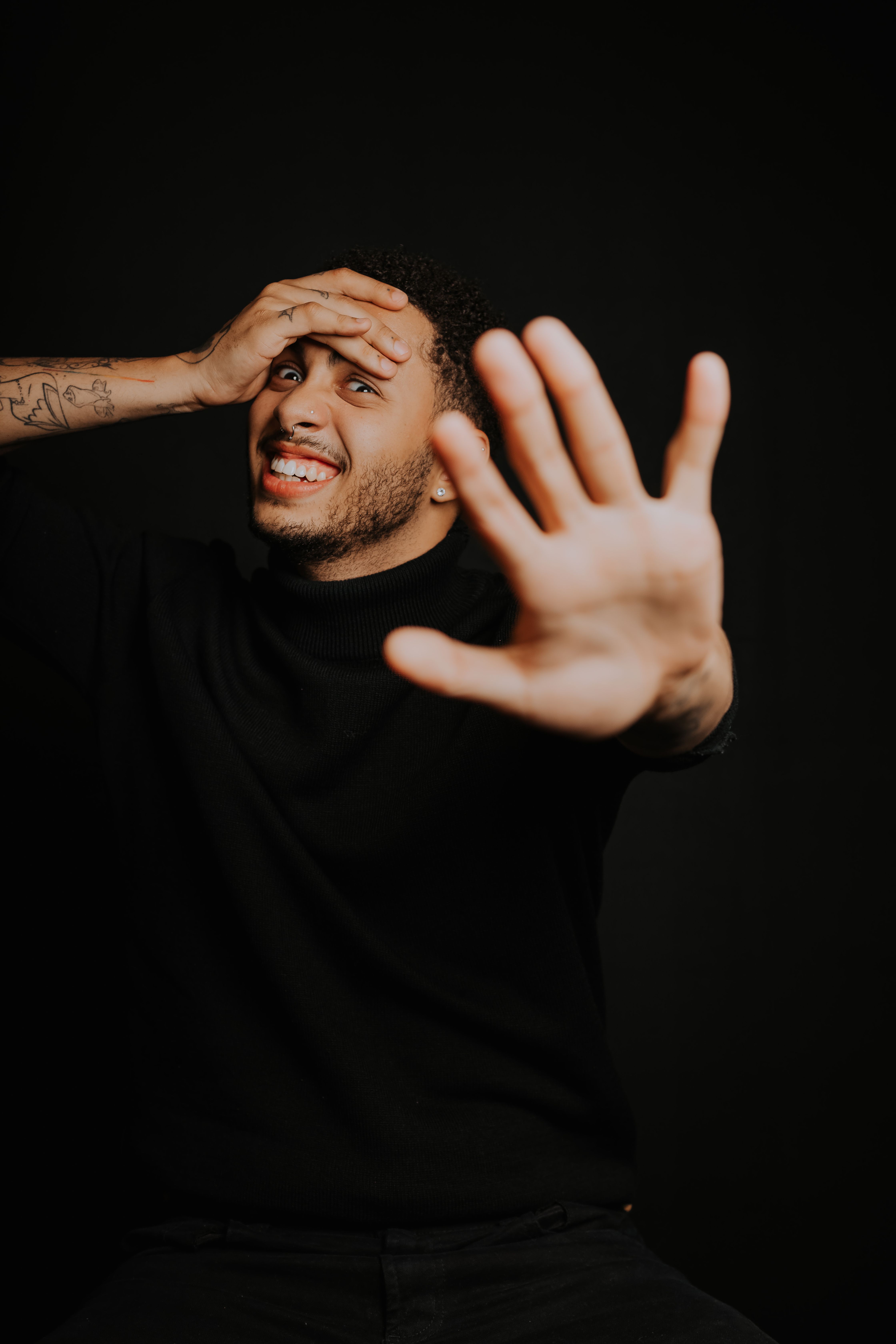 Man Facing Down While Holding HIs Head · Free Stock Photo