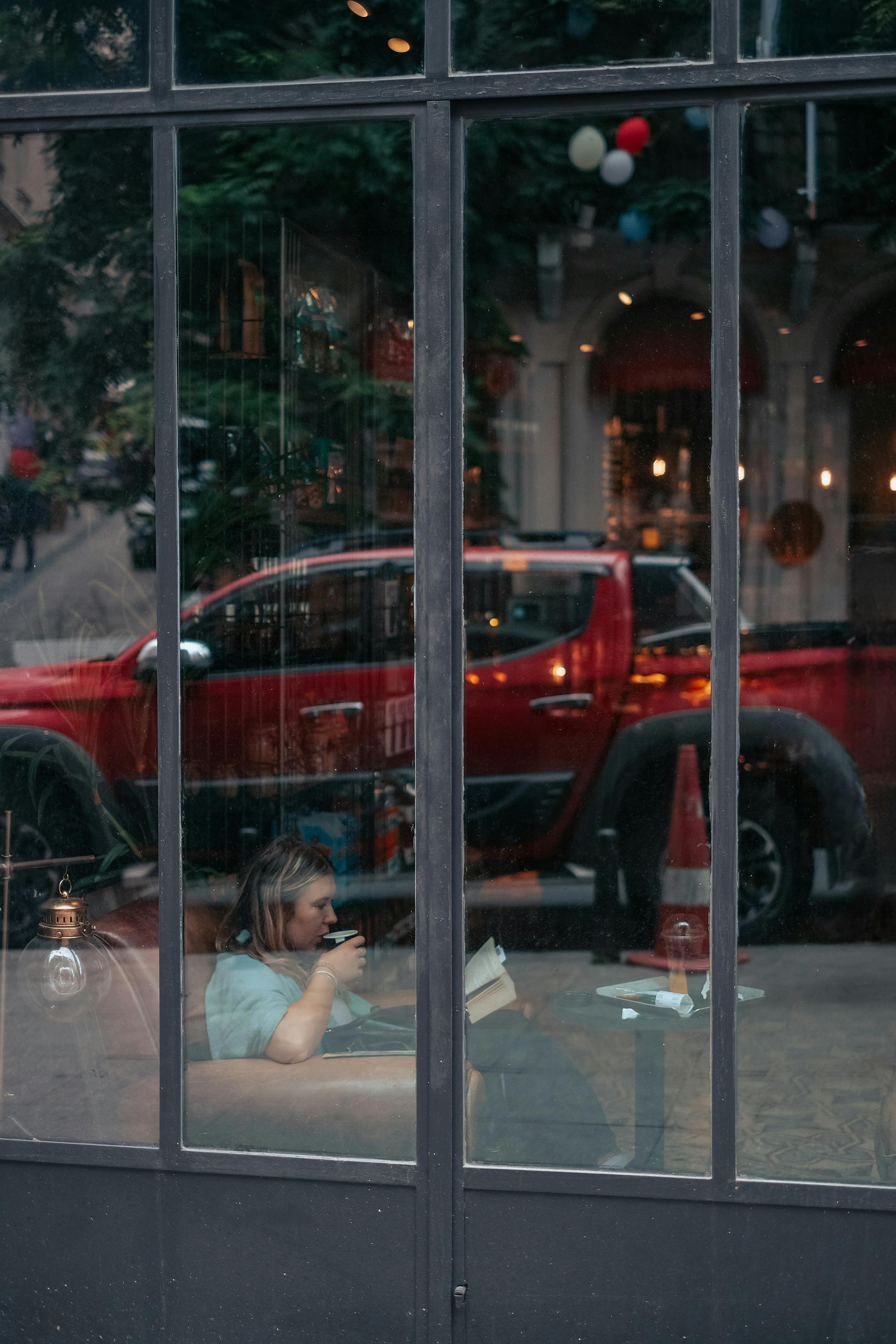 Car Reflecting in a Window · Free Stock Photo