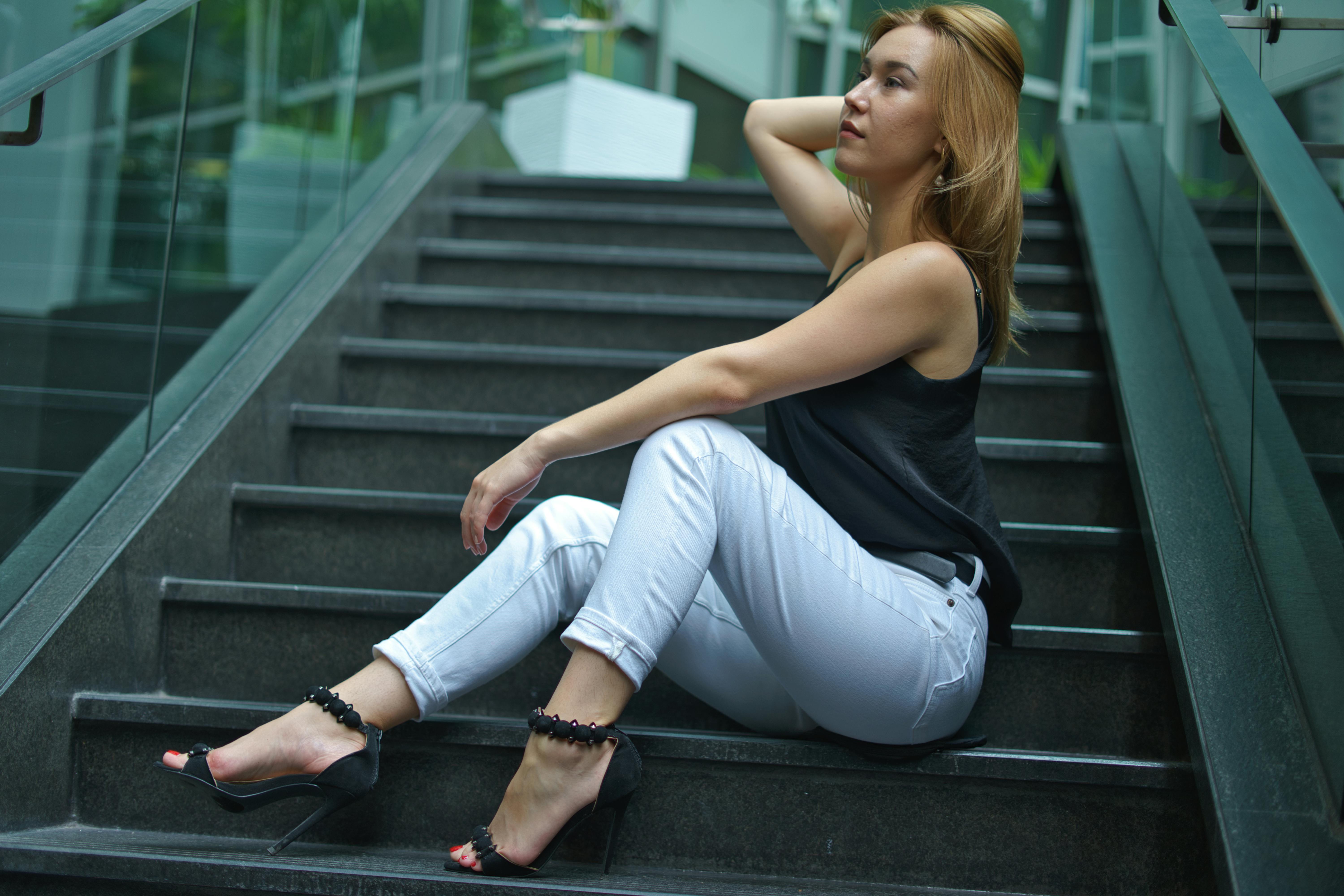 Woman Sitting on Stairs · Free Stock Photo